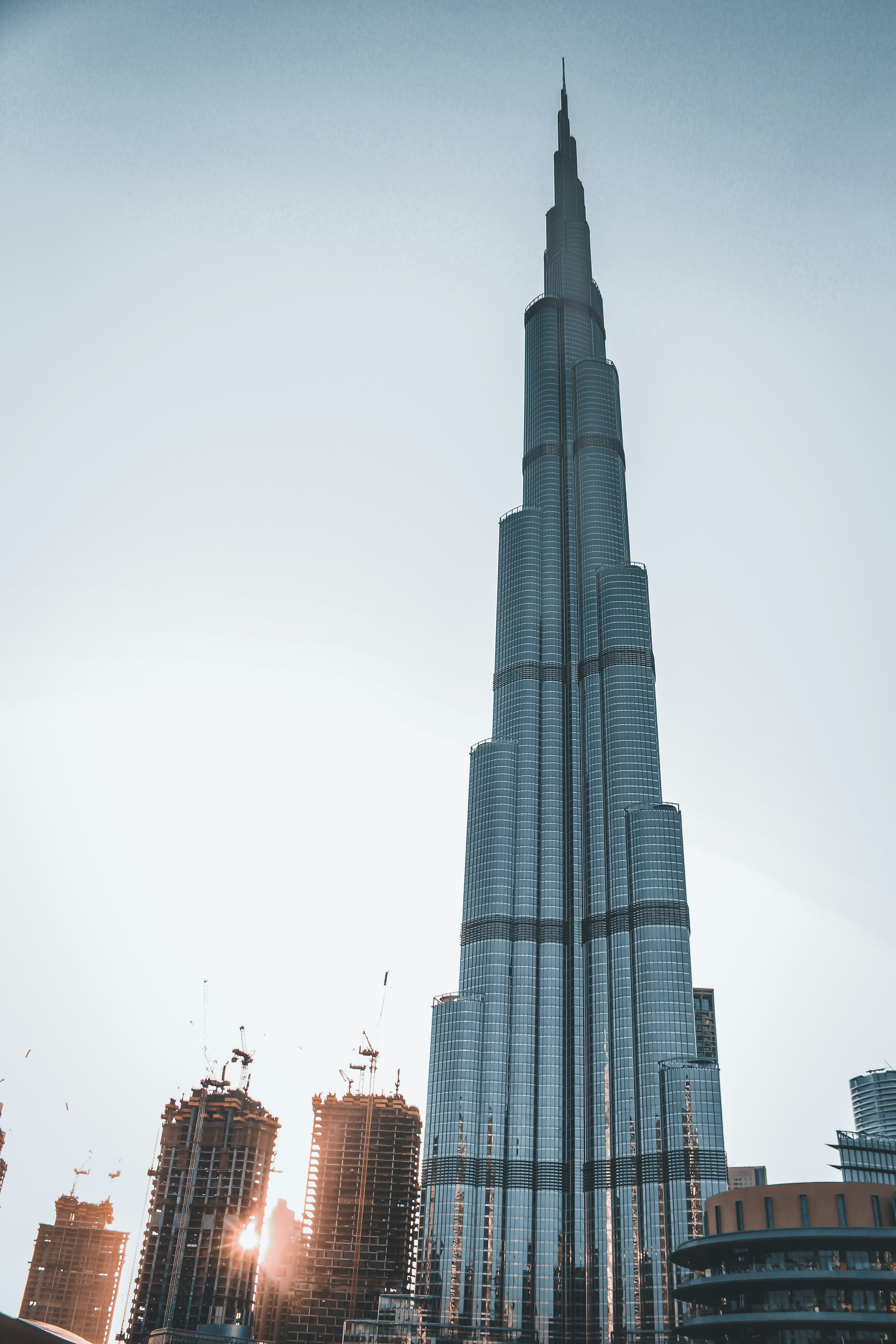White concrete building during daytime photo – Free Burj khalifa lake ...
