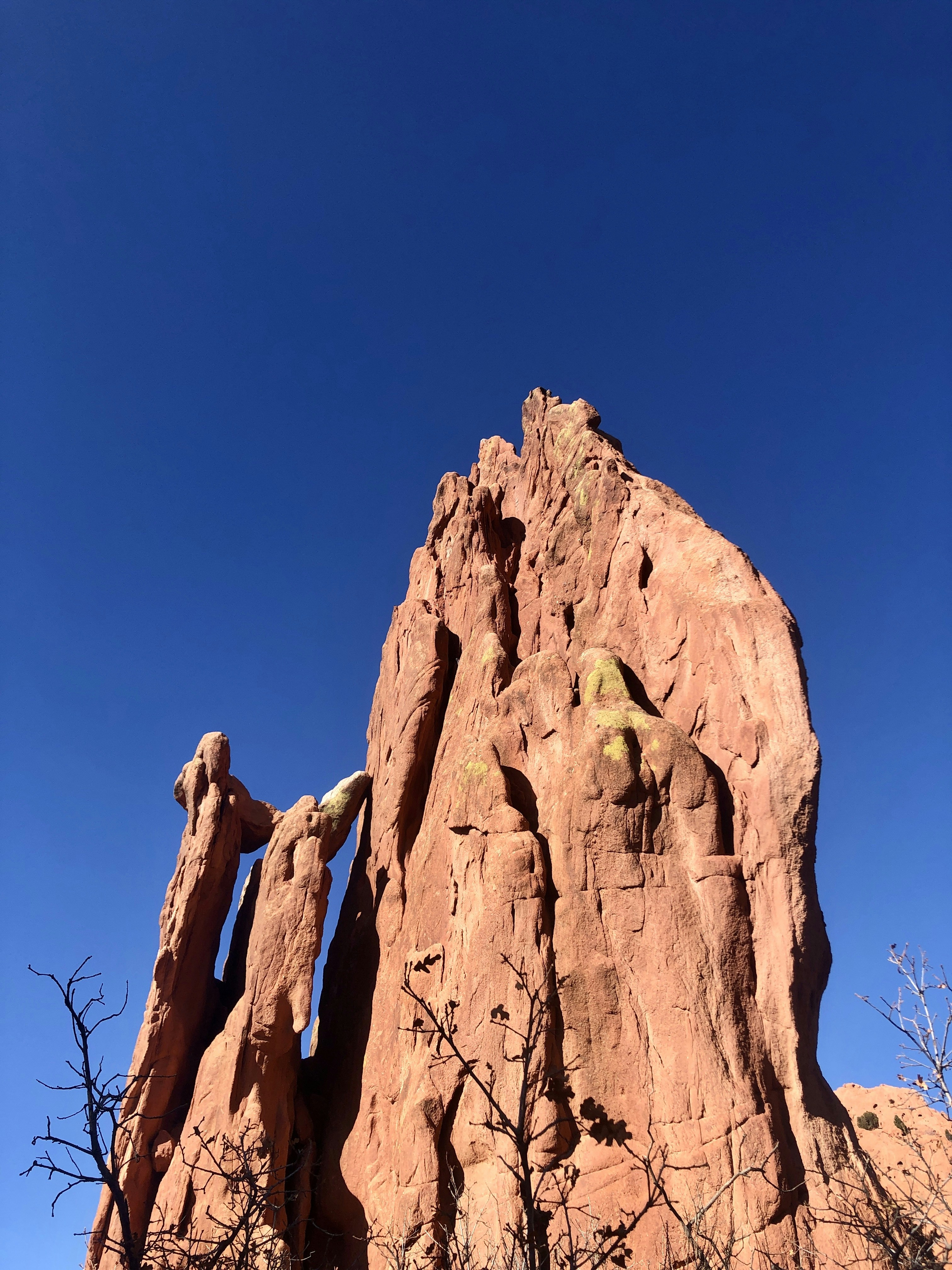 Crimson Spire: Desert Rock Portrait Under a Lapis Sky