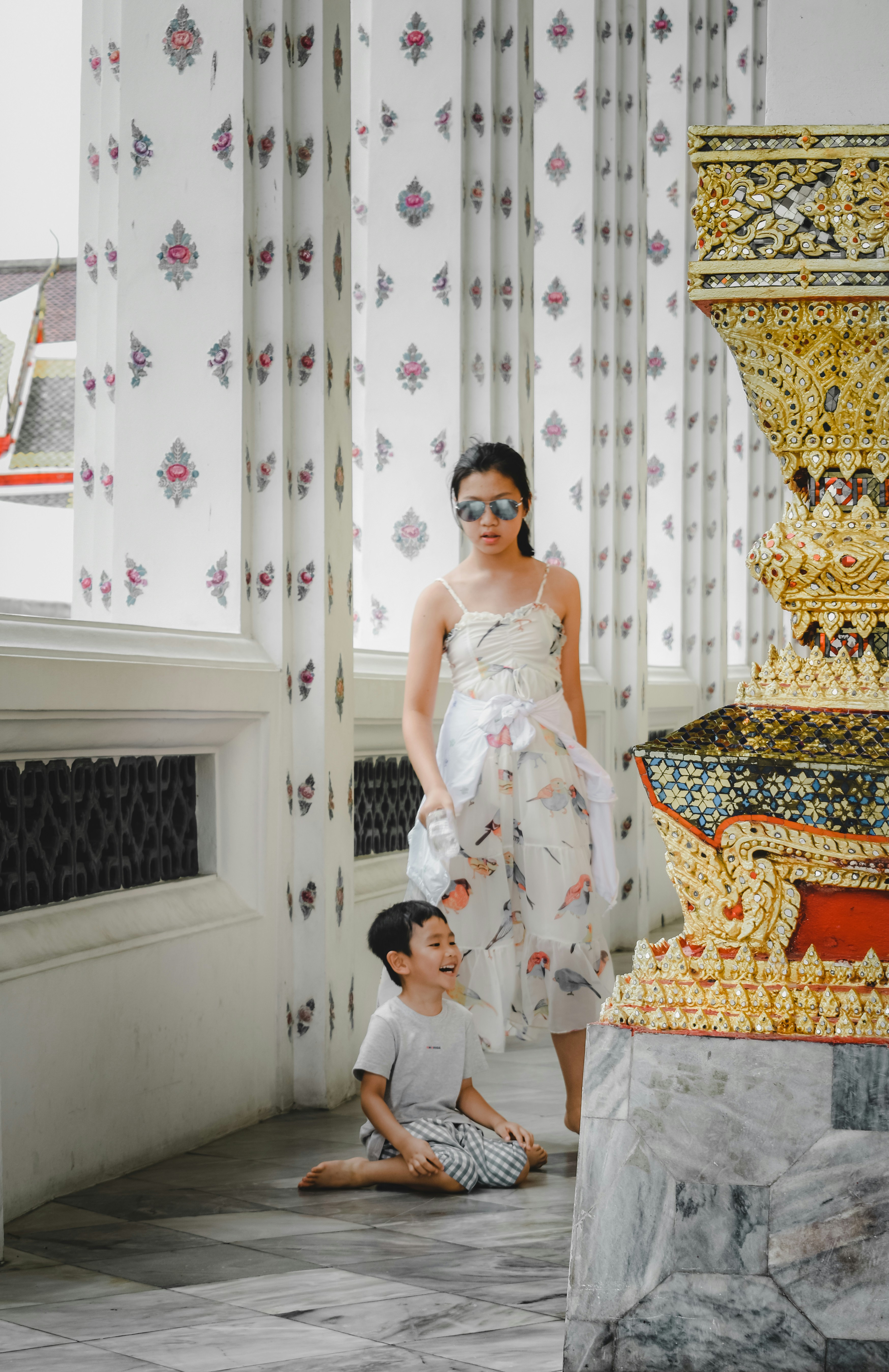 Serene Pause Amidst Ornate Columns