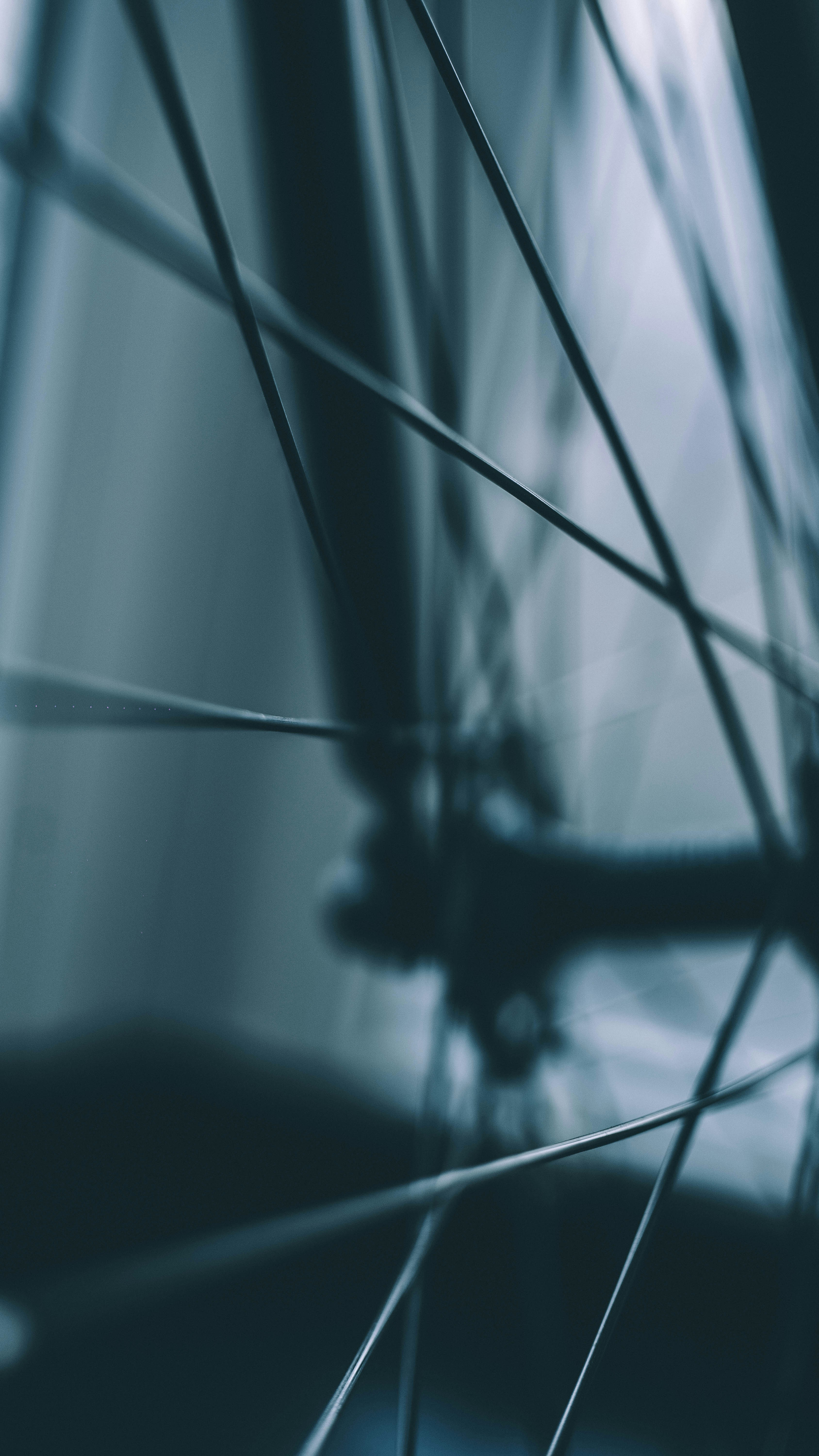 Tangled Spokes: A Blur of Metallic Lines in Motion