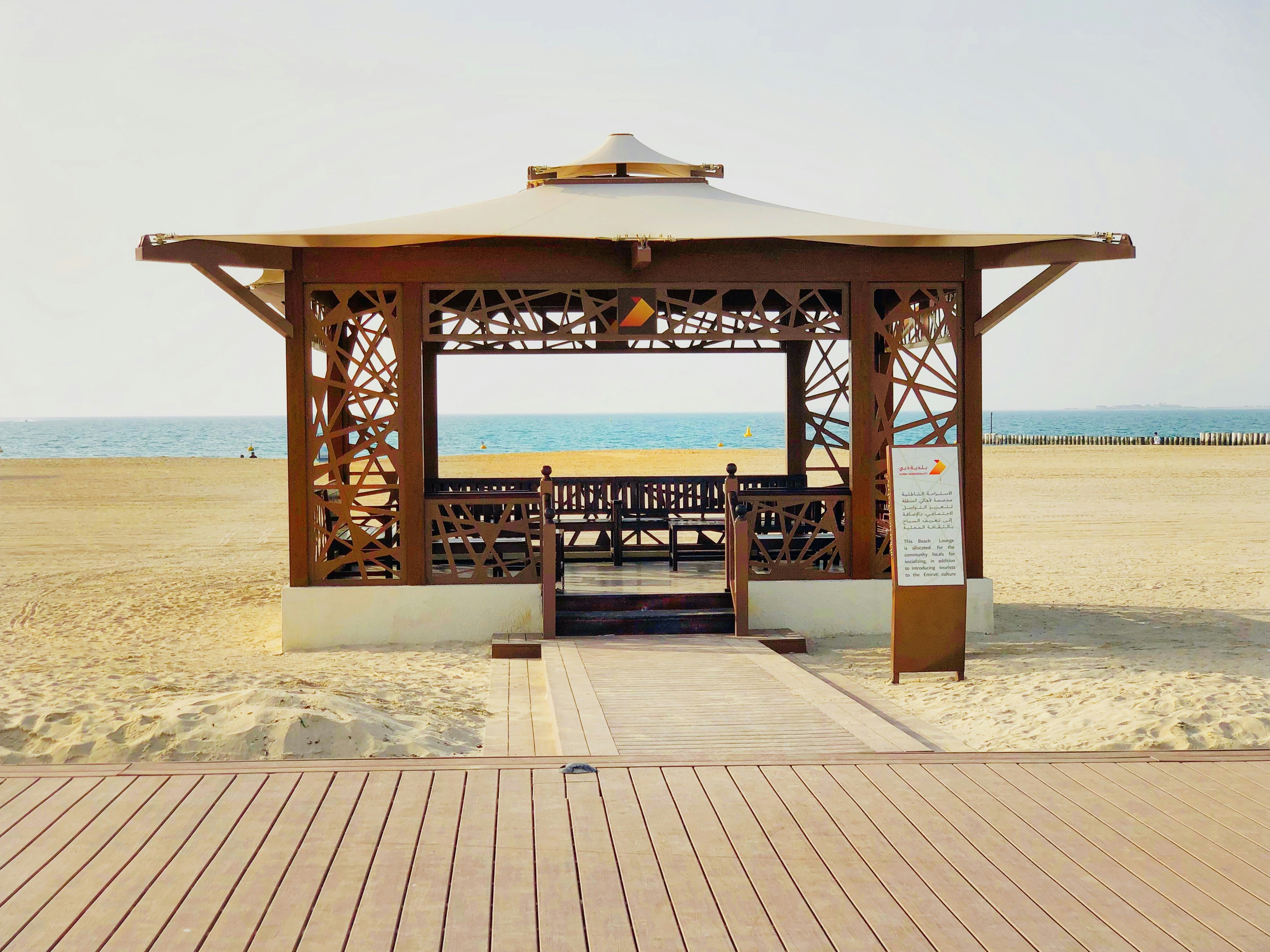 Seaside Pavilion Framed by Dune and Deck