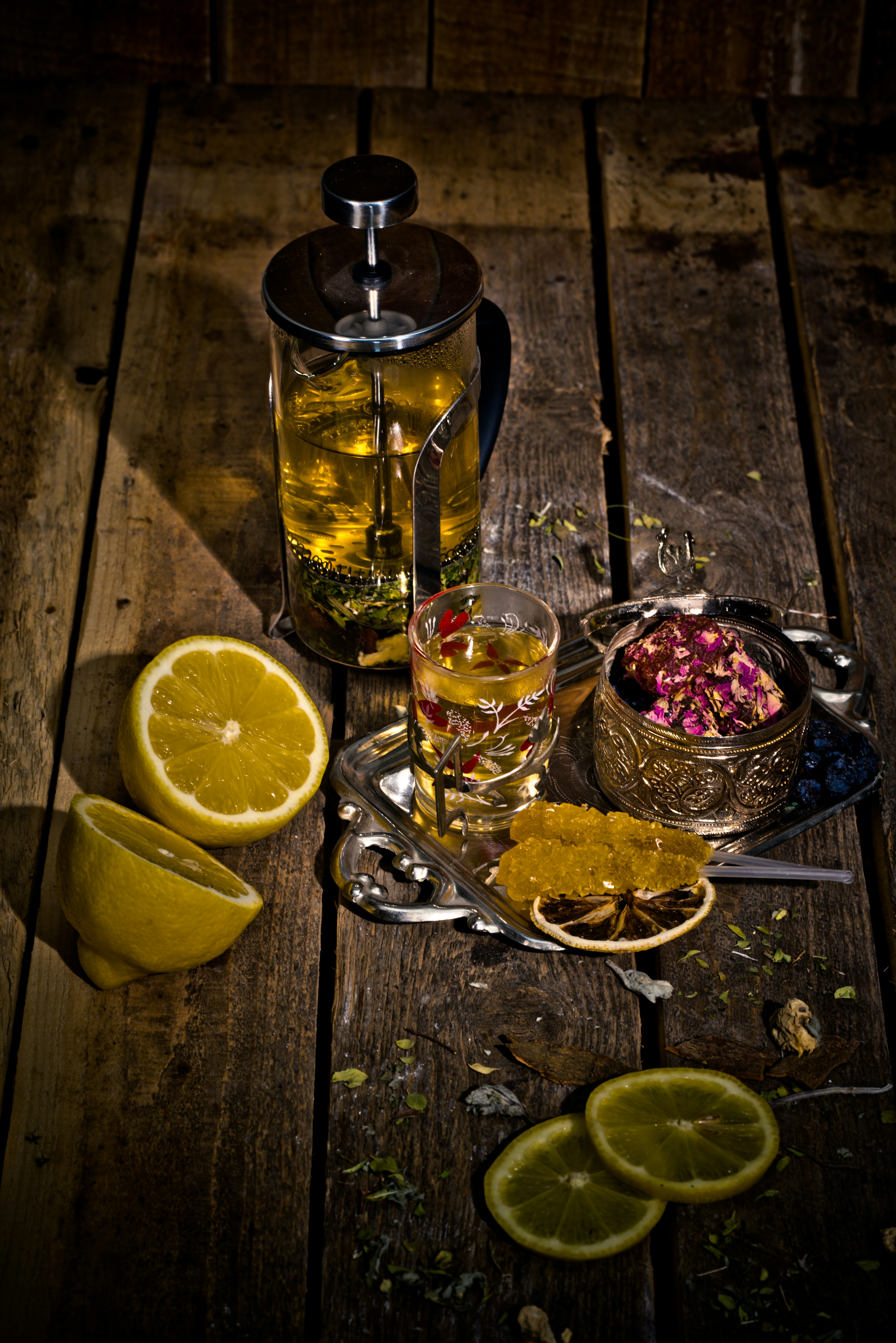 Amber Infusion on a Weathered Wood Table