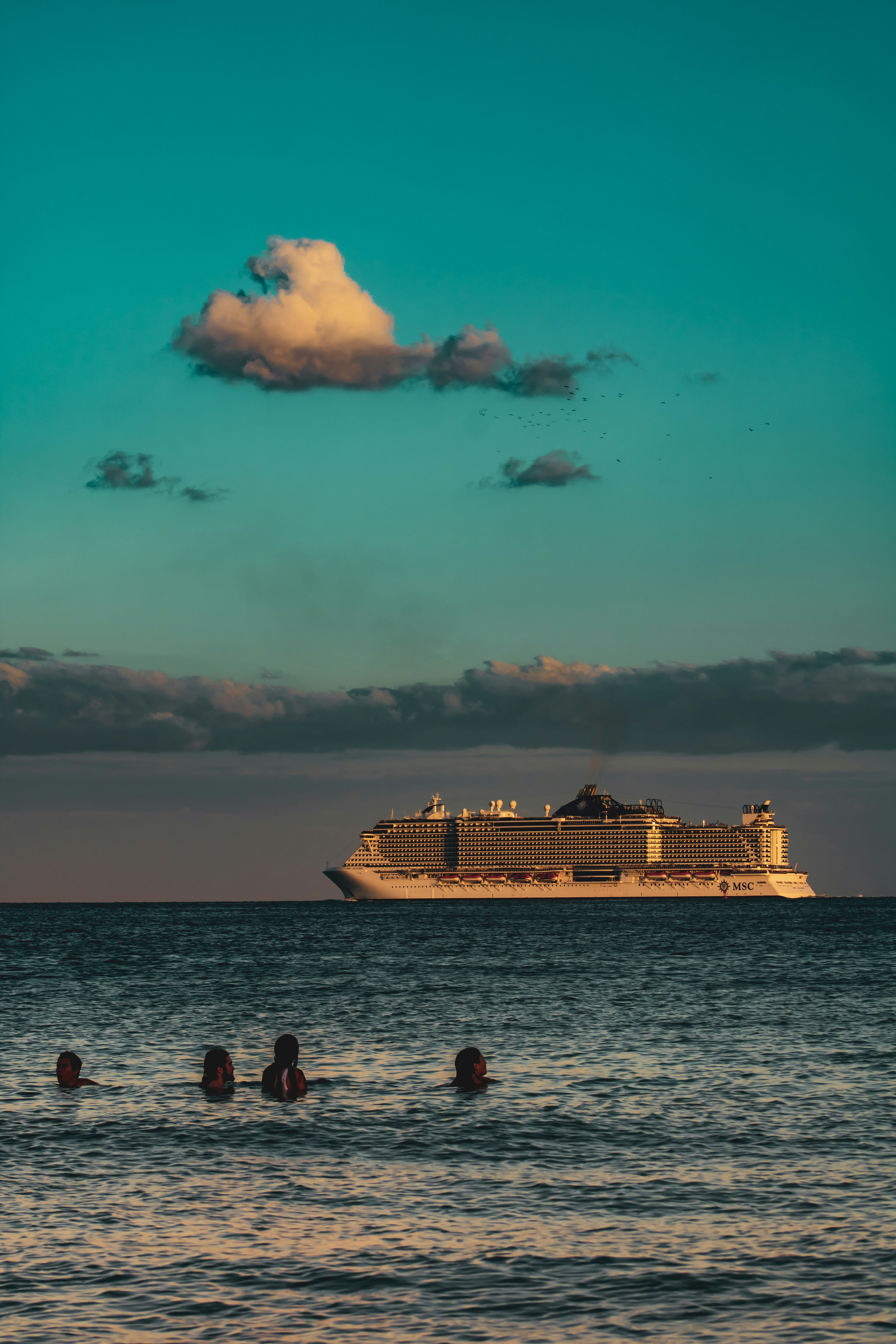People on beach during daytime photo – Free Beach Image on Unsplash