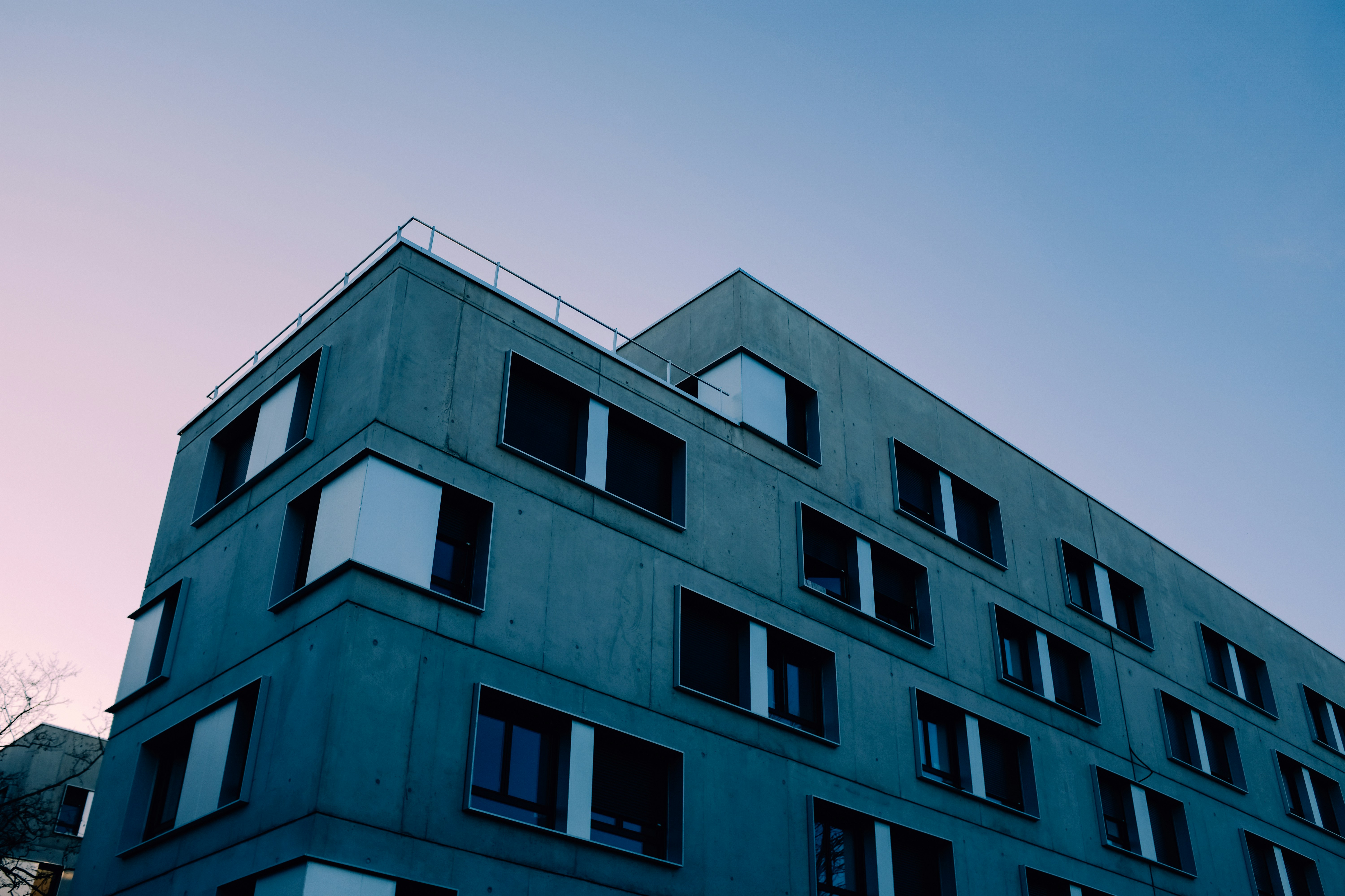 Blue concrete building under blue sky during daytime photo – Free Grey ...