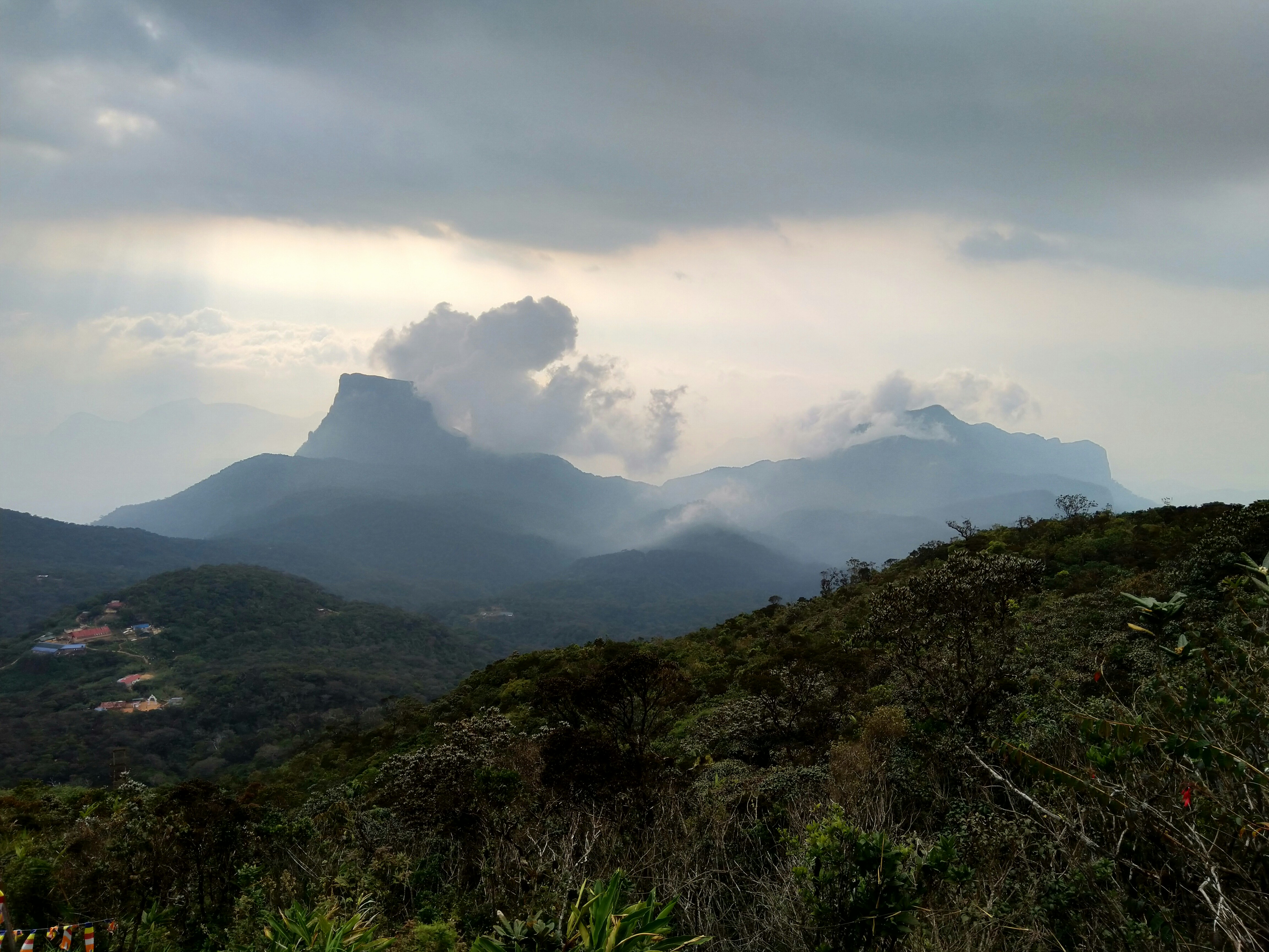 Mist over the Ridge: Distant Peaks Forlorn in the Valley
