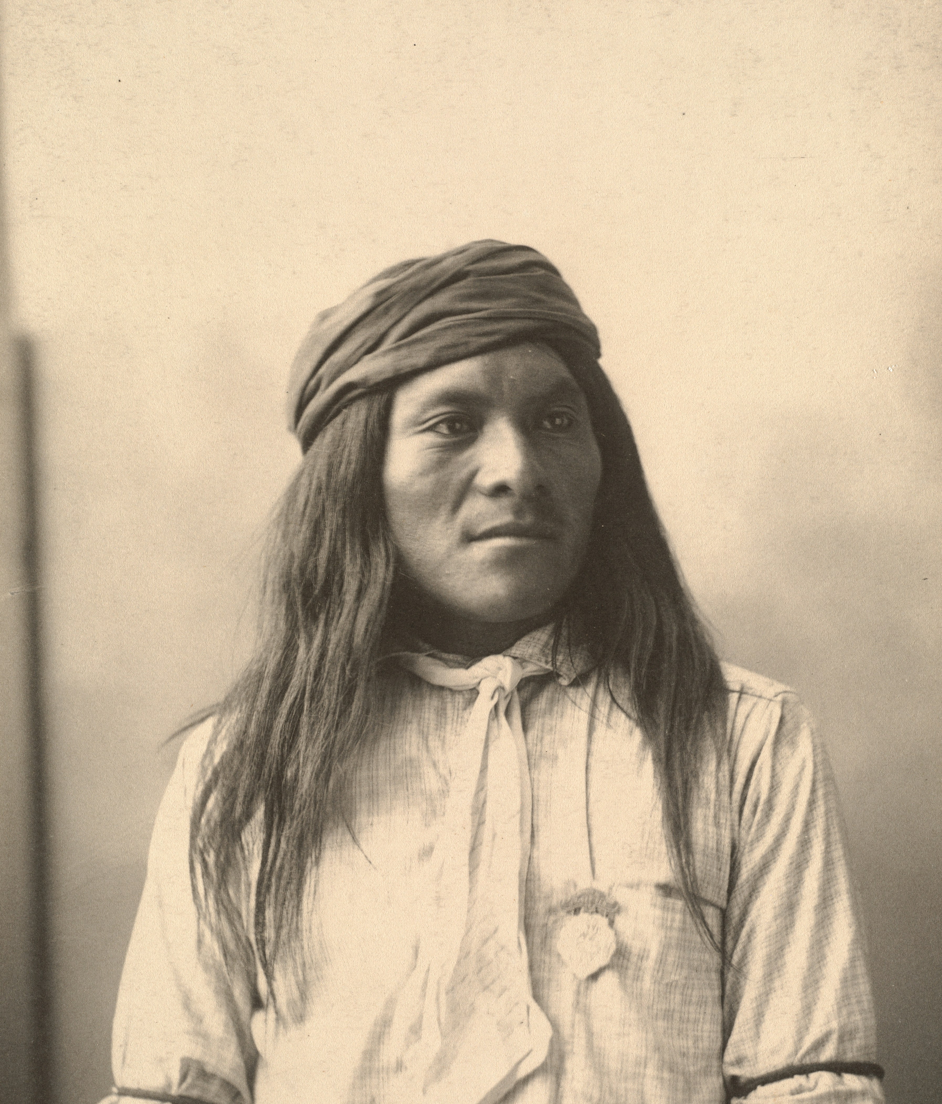Portrait of a man adorned in traditional attire, showcasing cultural heritage and identity.