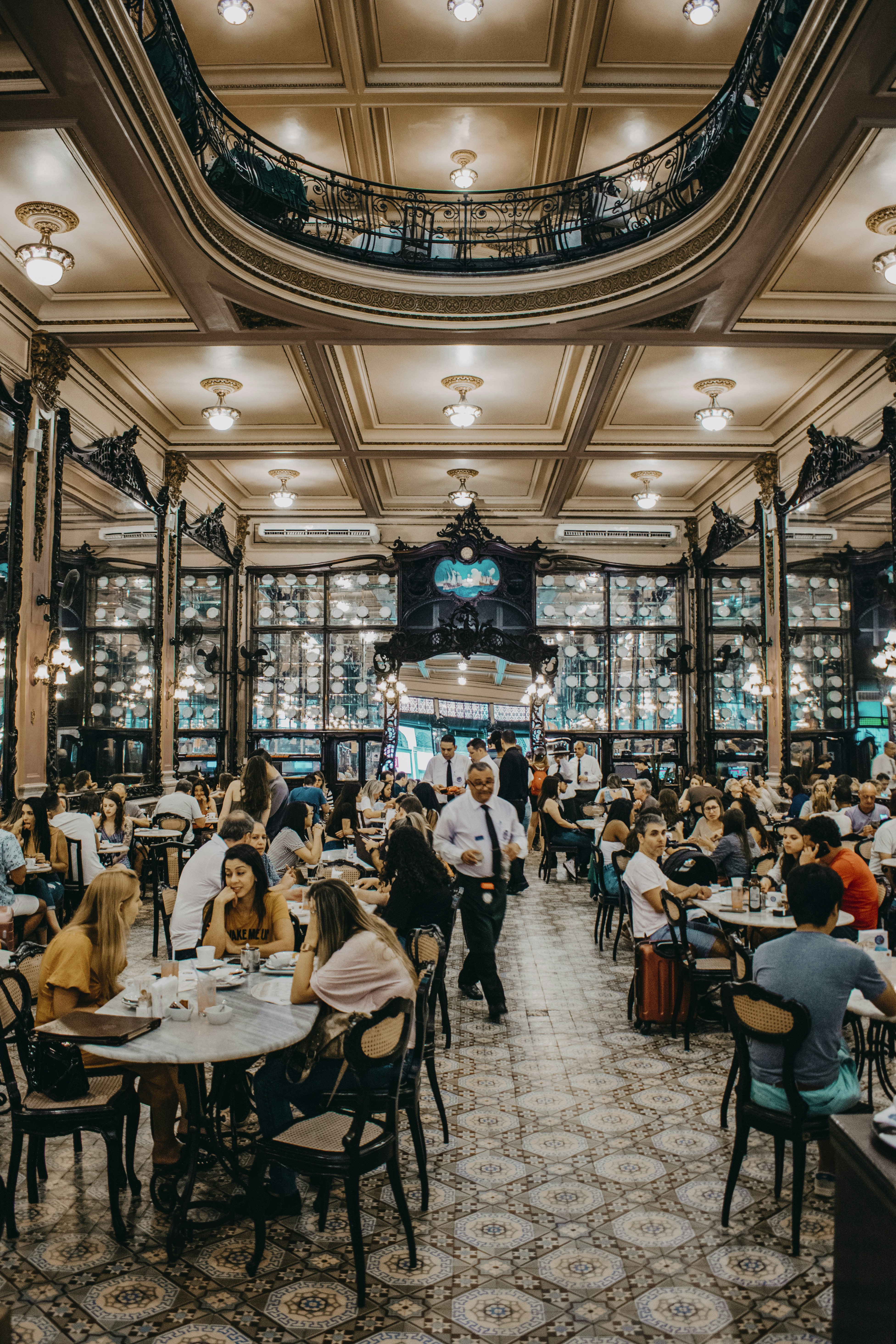 People sitting on chair inside restaurant photo – Free Restaurant Image ...