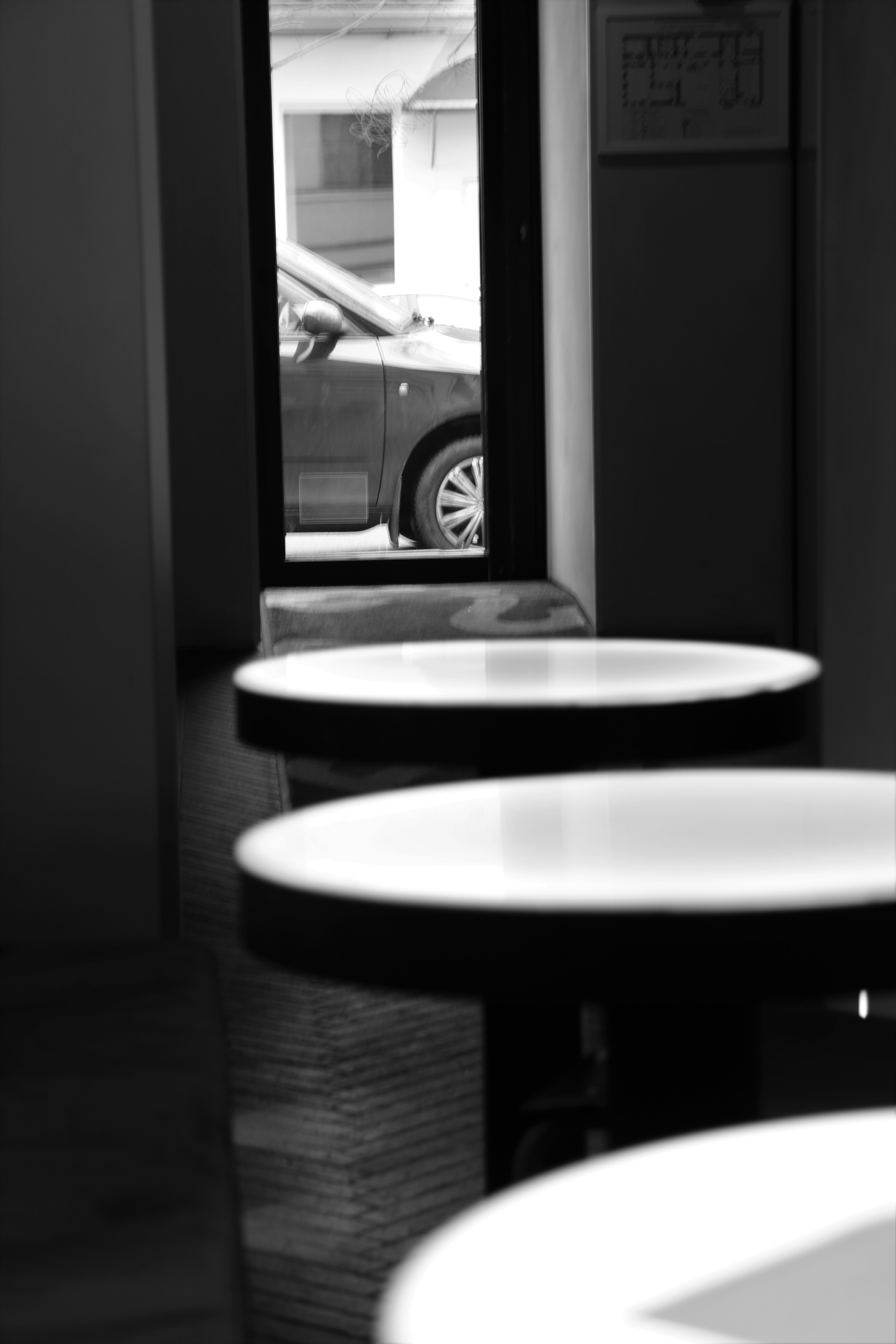 grayscale photo of round table