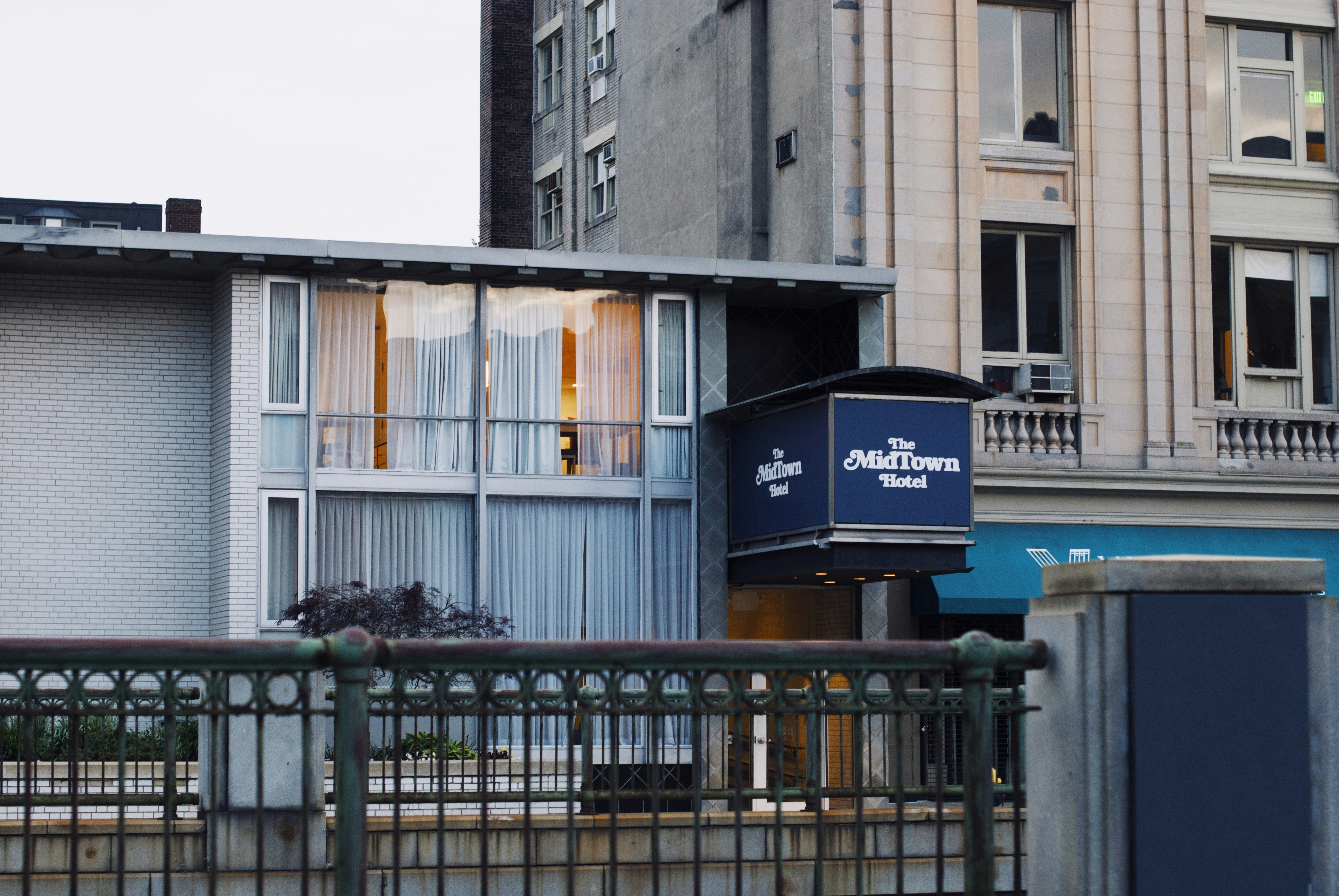 Midtown Beacon Framed by Rails and Glass Facade