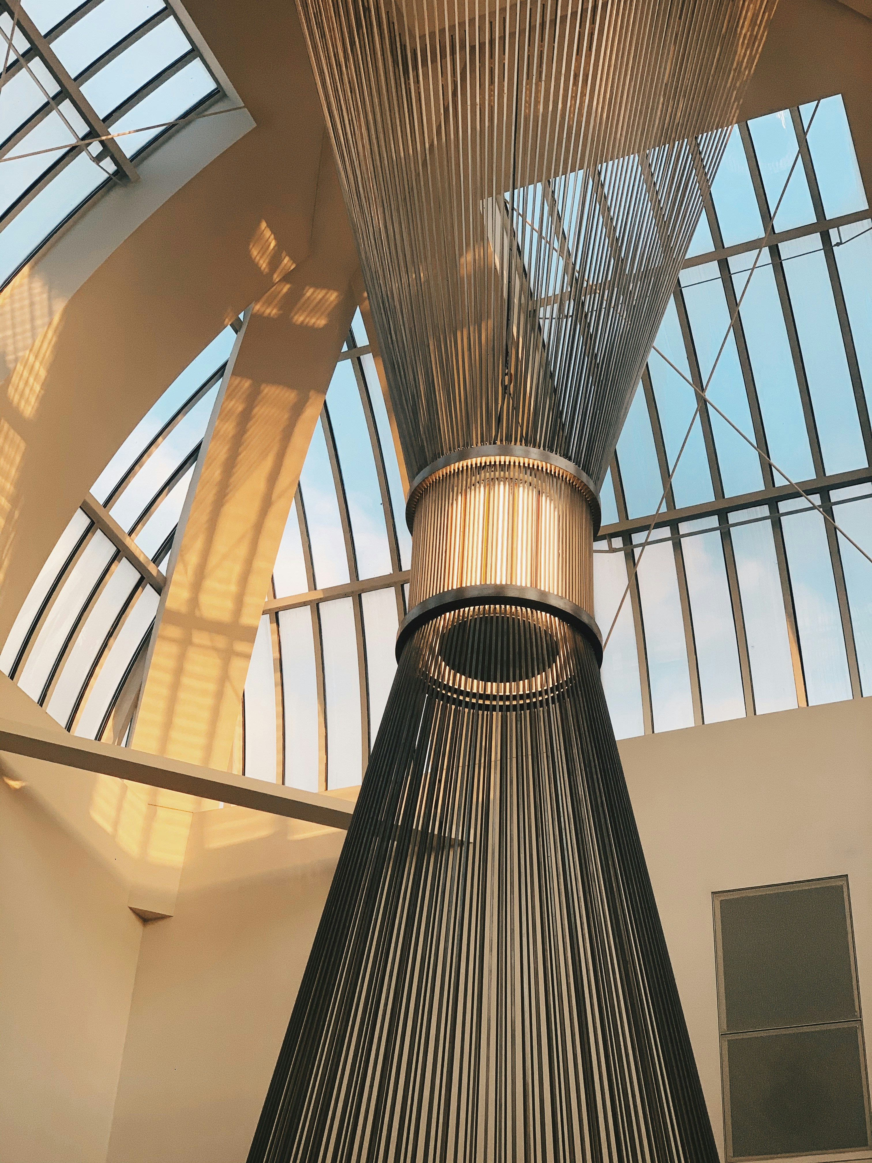 Architectural Cascade: String StructureDescending Toward a Center Ring