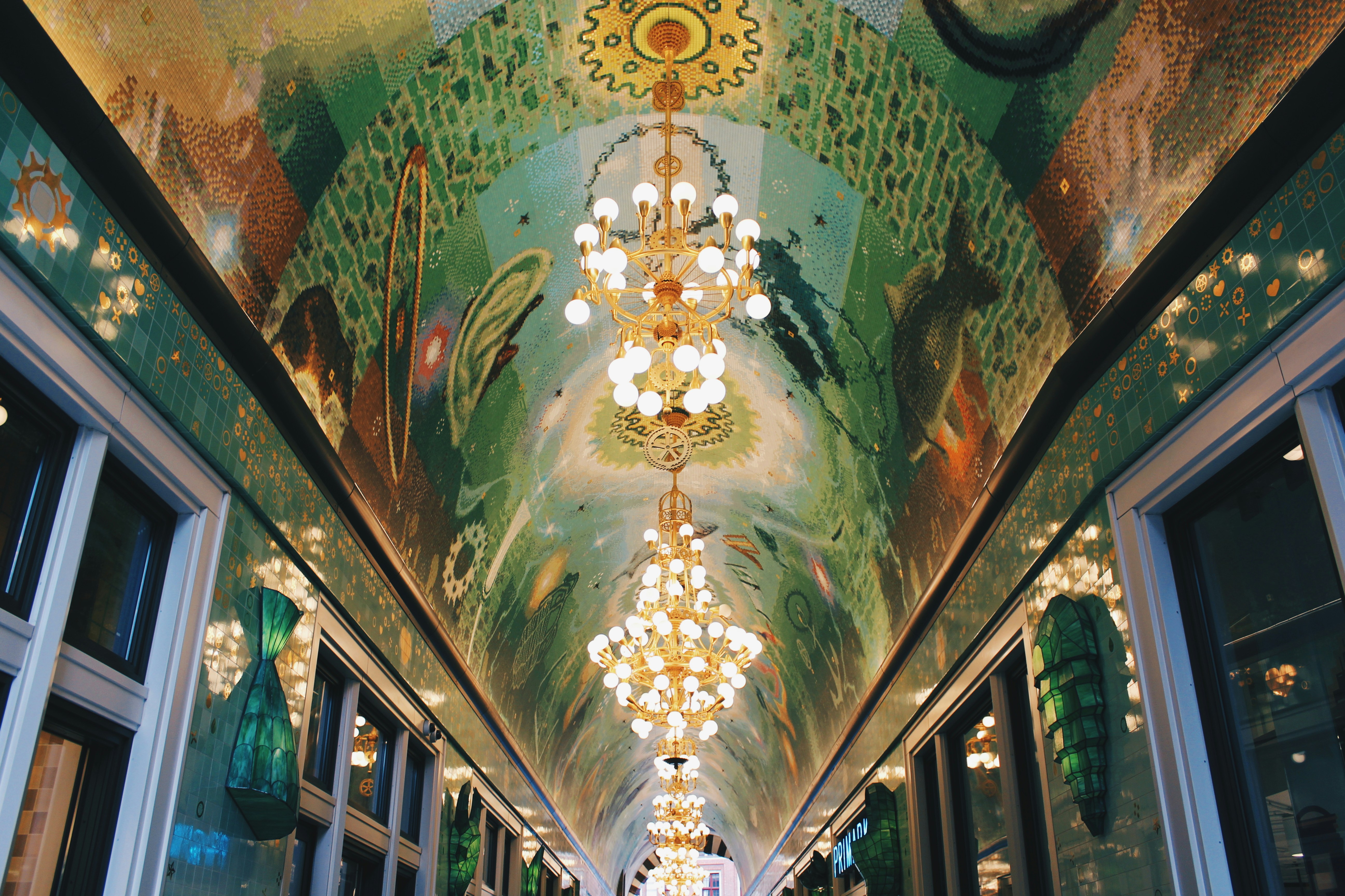 Verdant Vaults: The Hallway of Painted Ceilings and Crystal Chandeliers