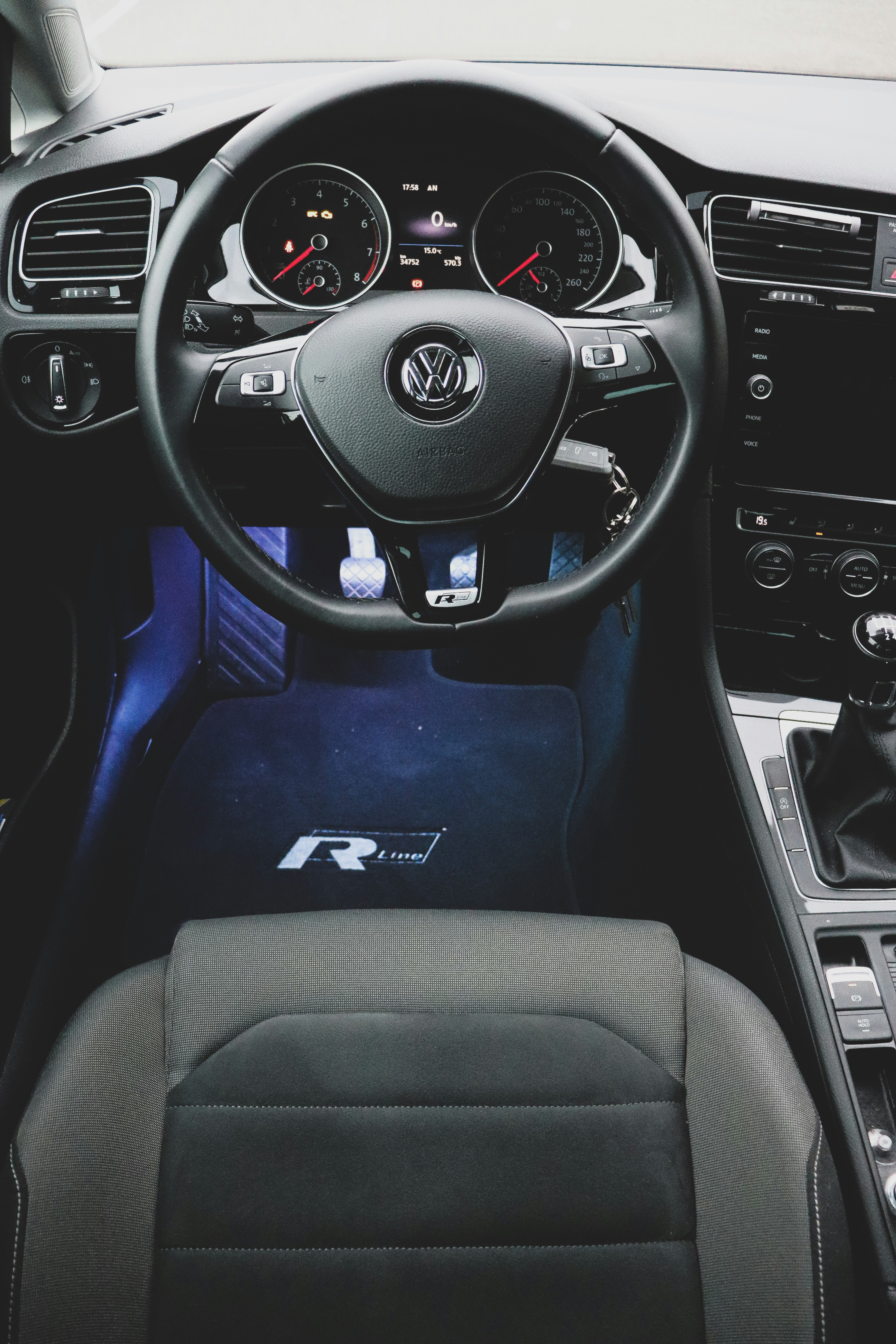 Blue-lit R-Line Cockpit: The VW Steering Wheel at the Heart of the Cabin