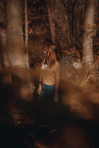 Autumn Echo: A Woman in the Forest Veiled by Velvet Haze