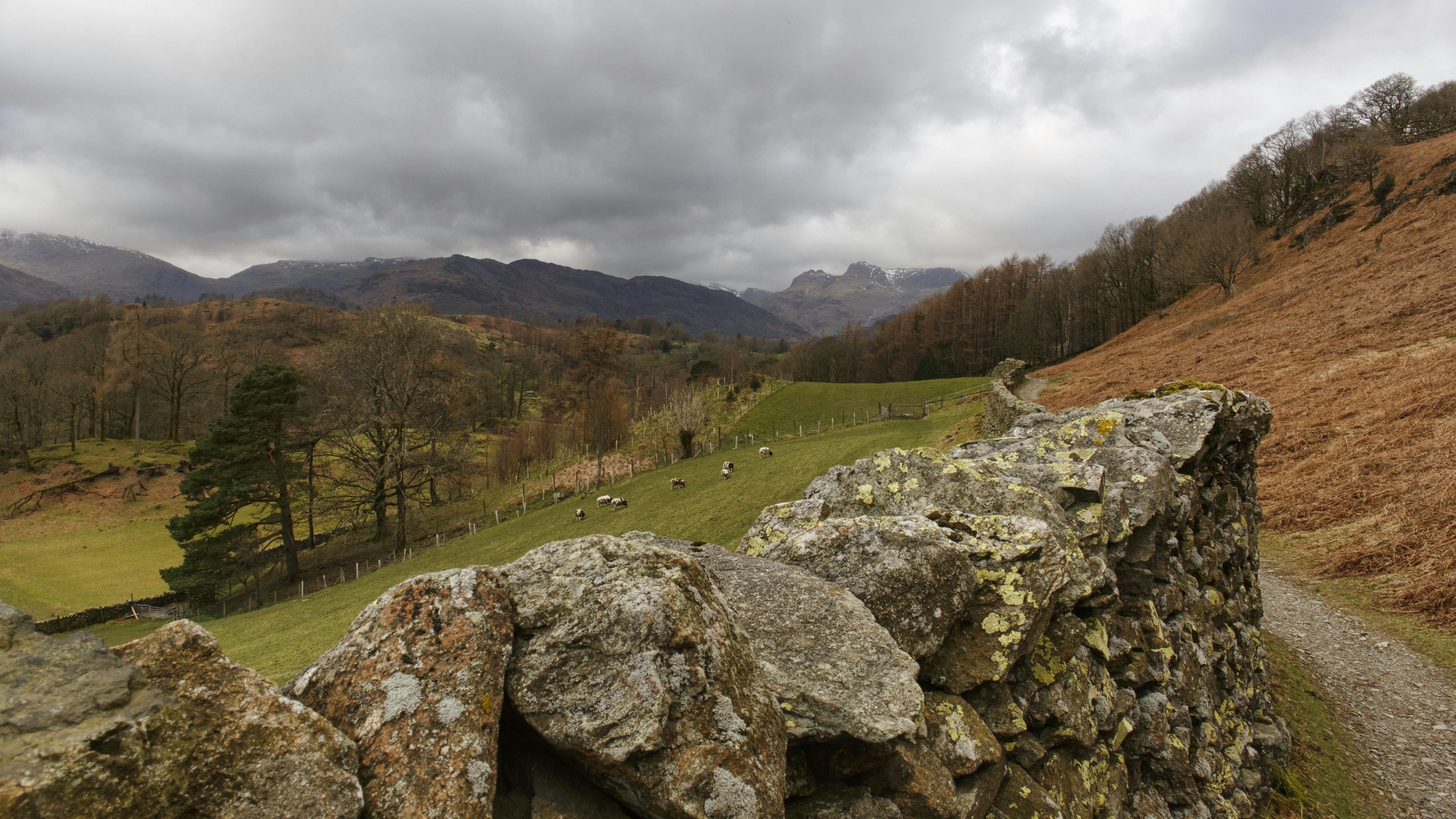 Gray rocky mountain under gray cloudy sky during daytime photo – Free ...