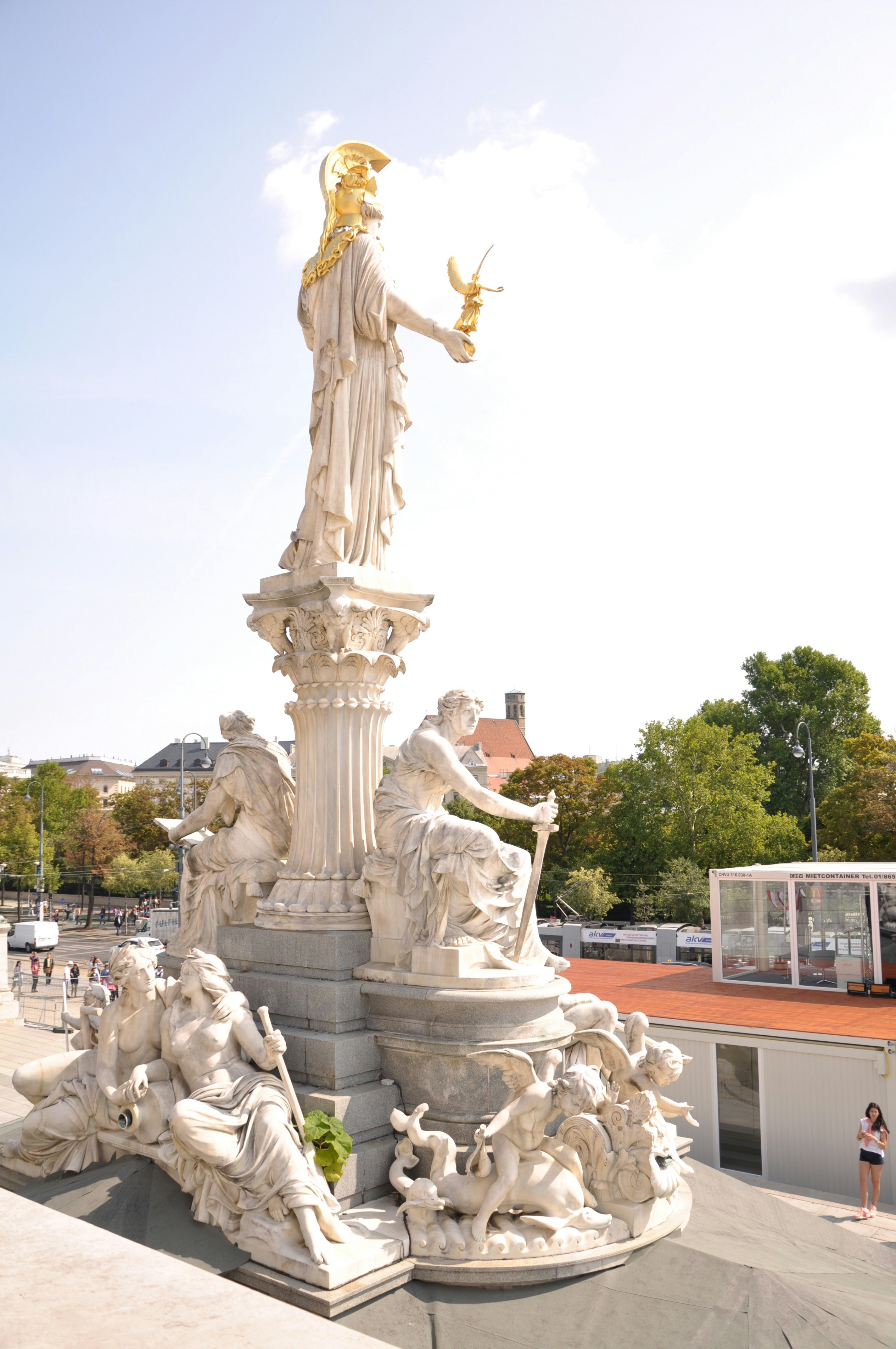 Crown of Sunlight: Marble Allegories Rising in a City Square
