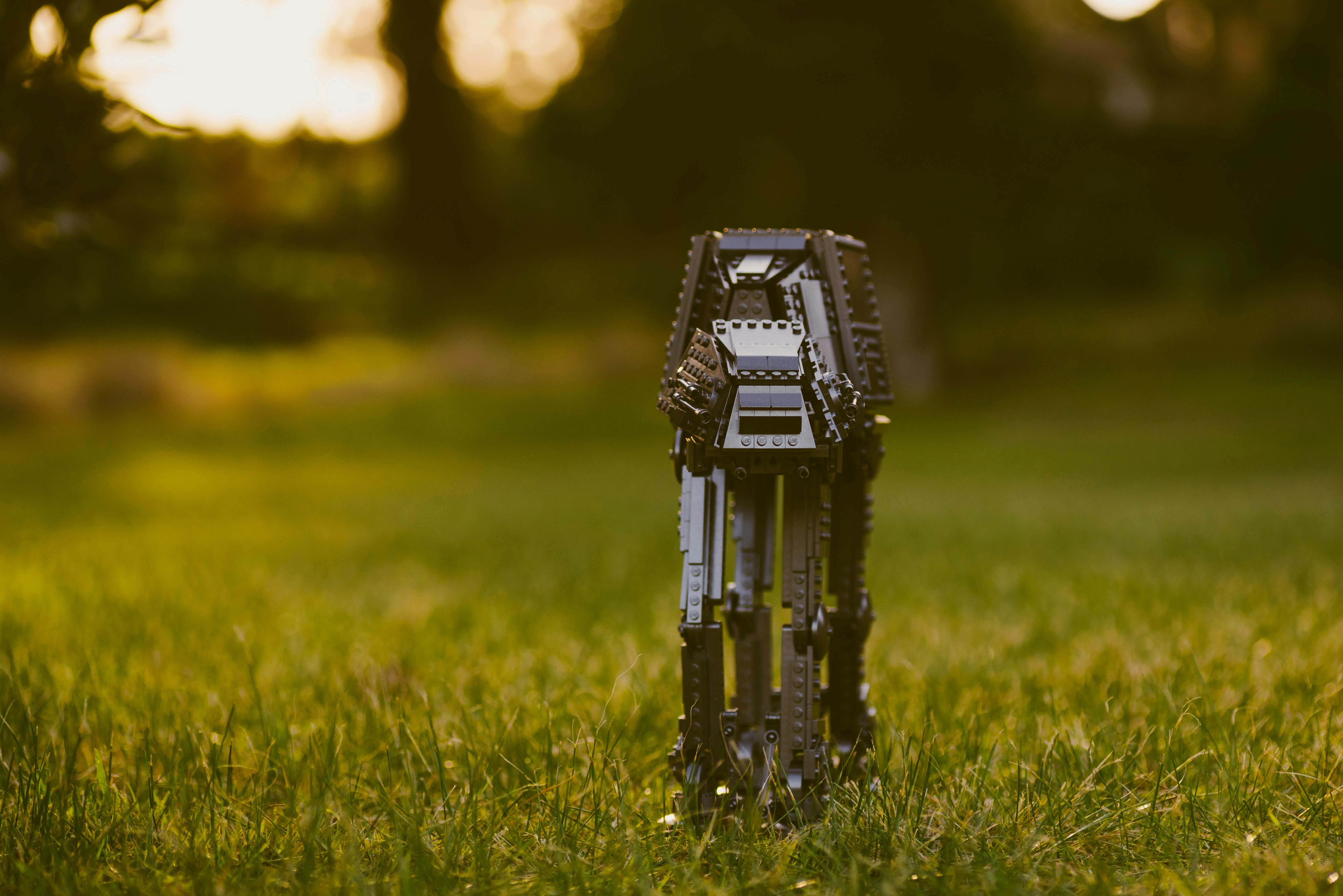 Black lego toy on green grass during daytime photo – Free Green Image ...