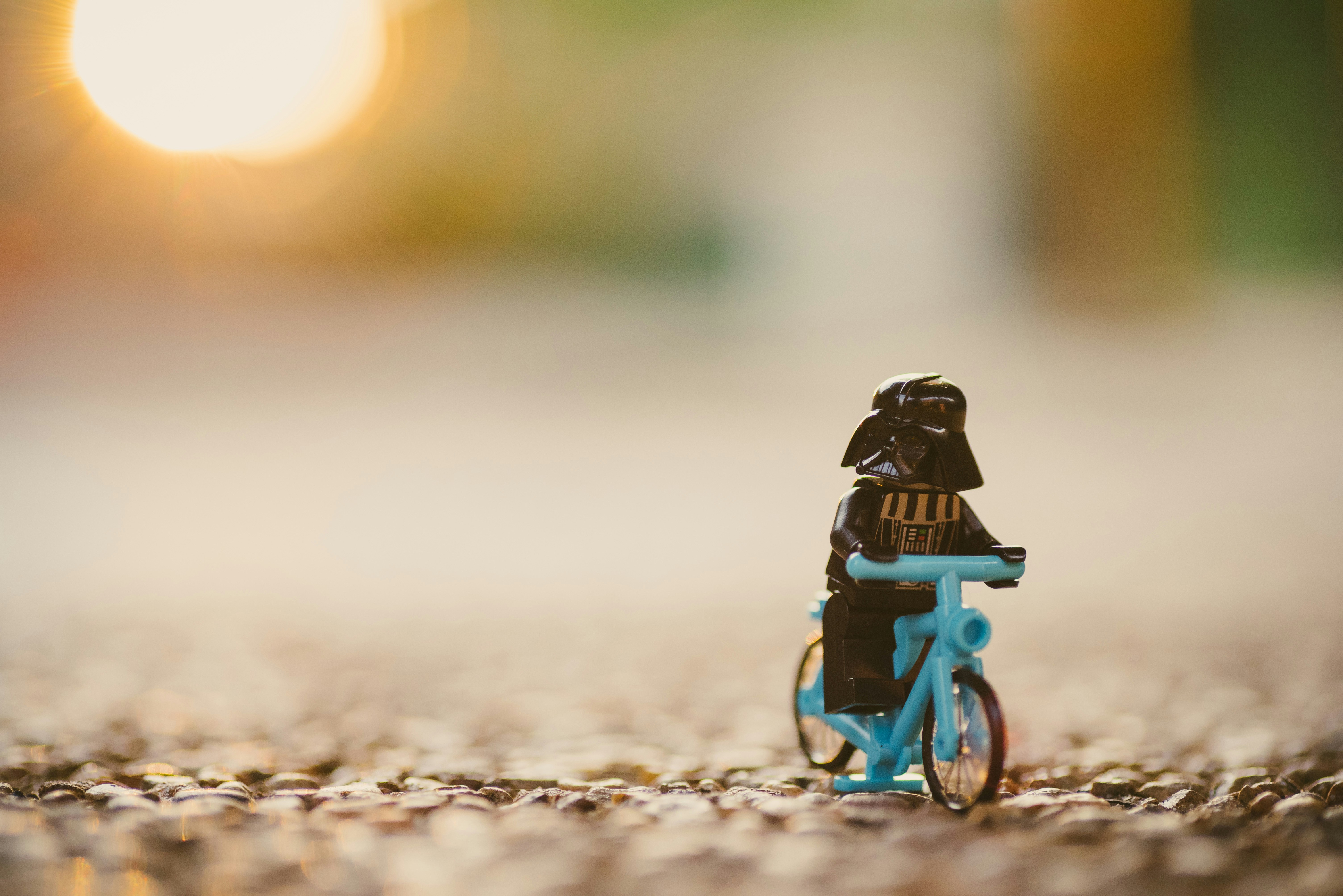 Darth Vader on a cobalt bicycle: a miniature odyssey on sunlit pavement
