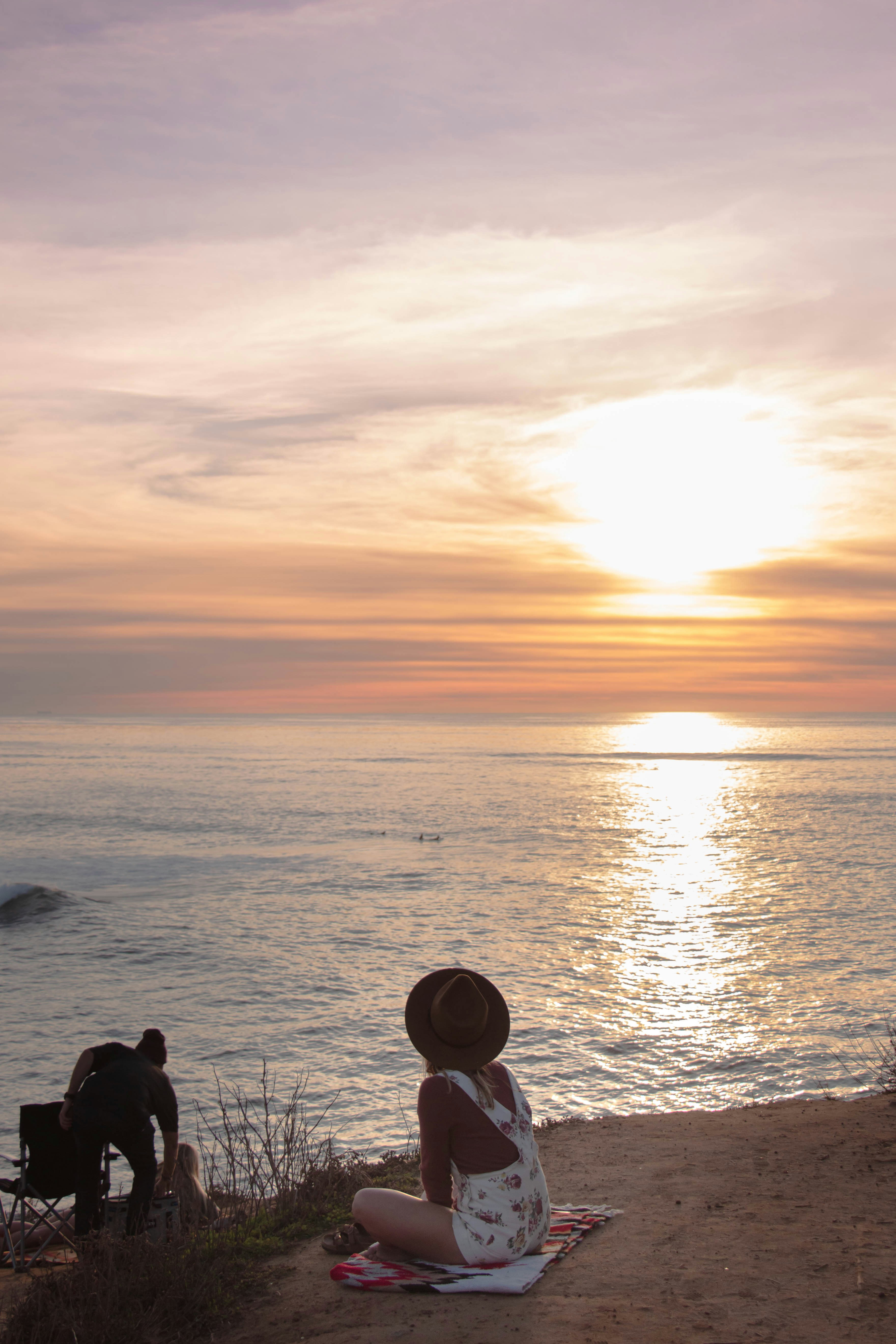 Sunlit Quiet: A Seaside Moment at Dusk
