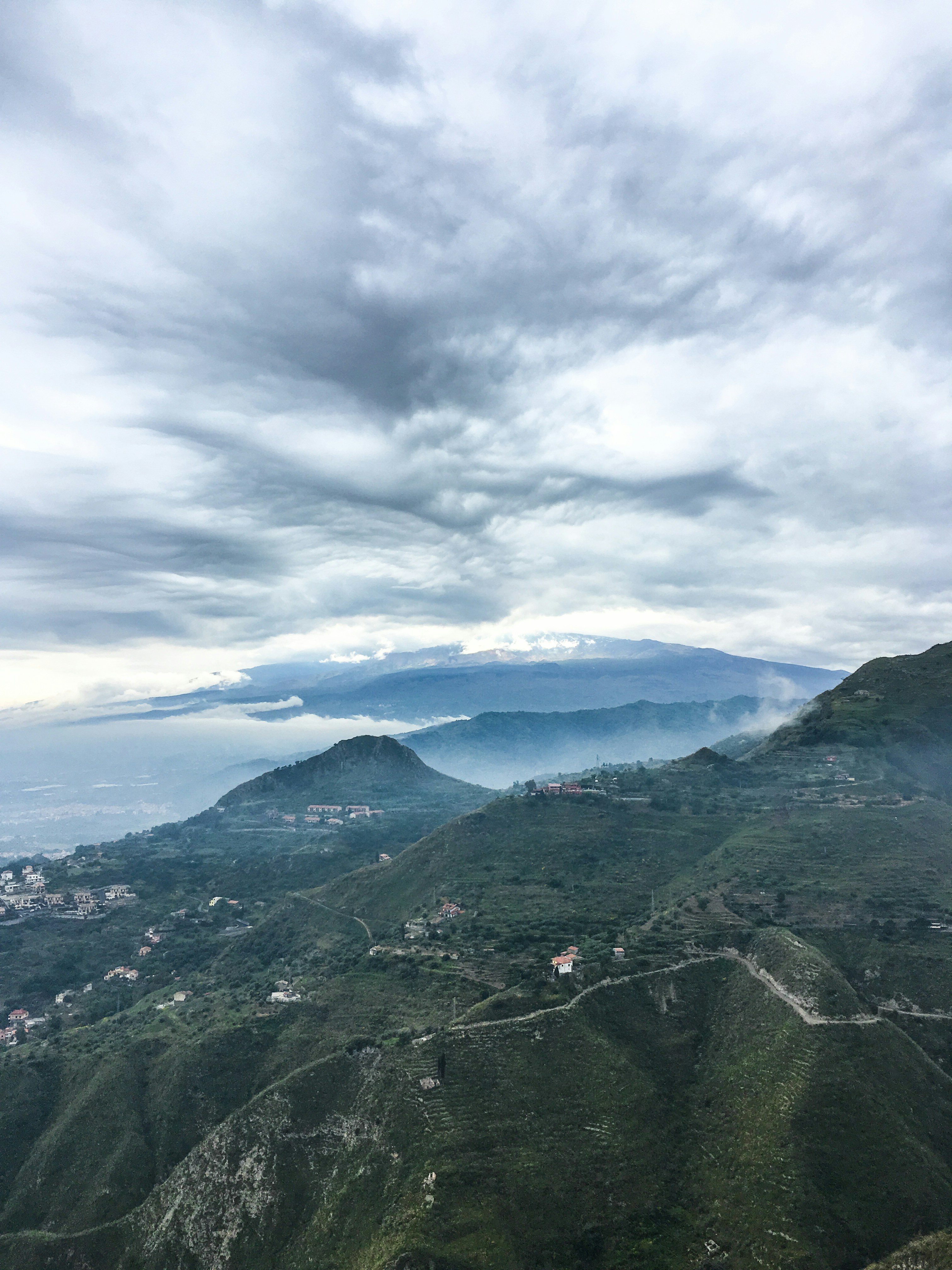 Whispers of Mist Over Verdant Peaks