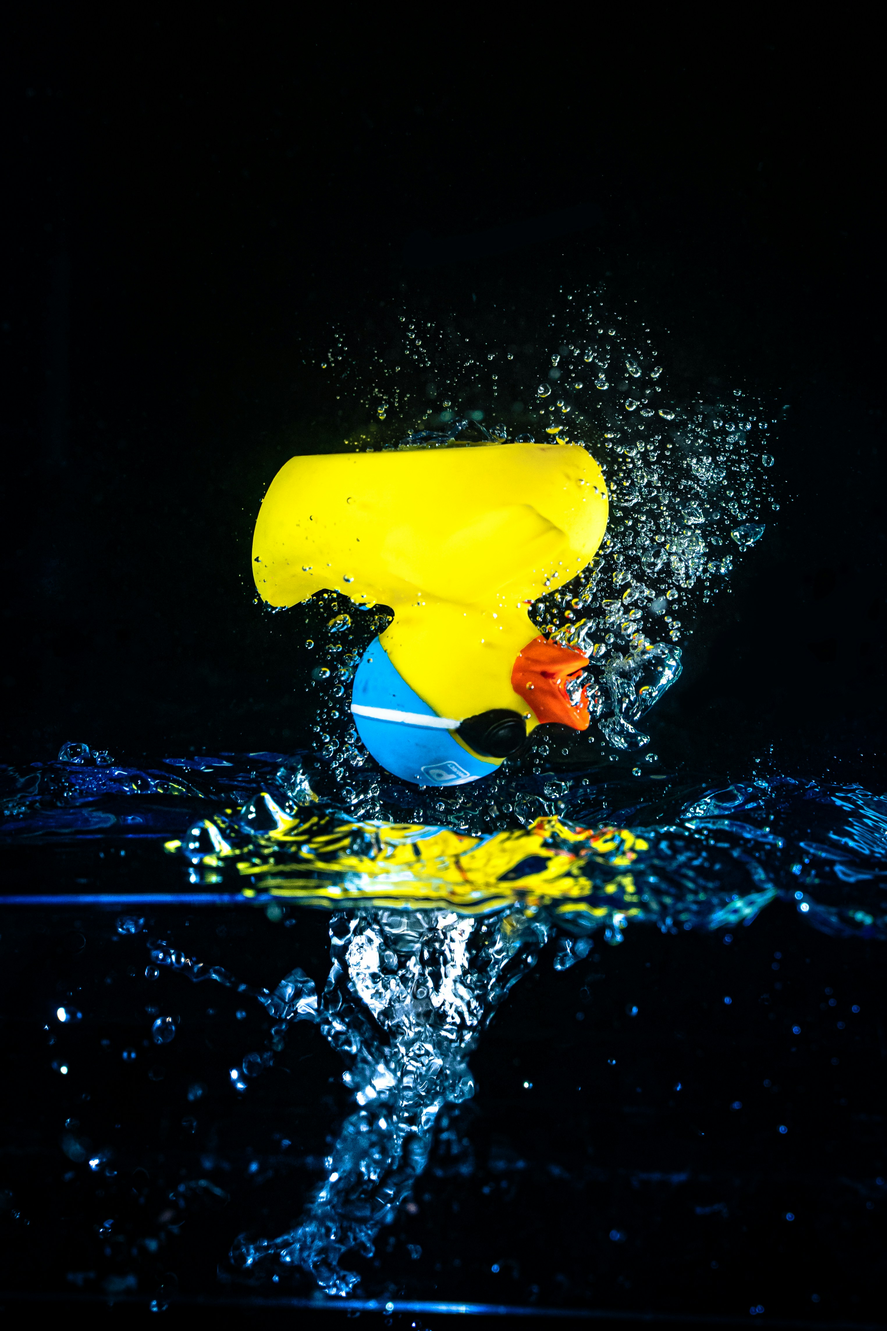 Midnight Splash: A Yellow Rubber Duck Illuminates the Dark