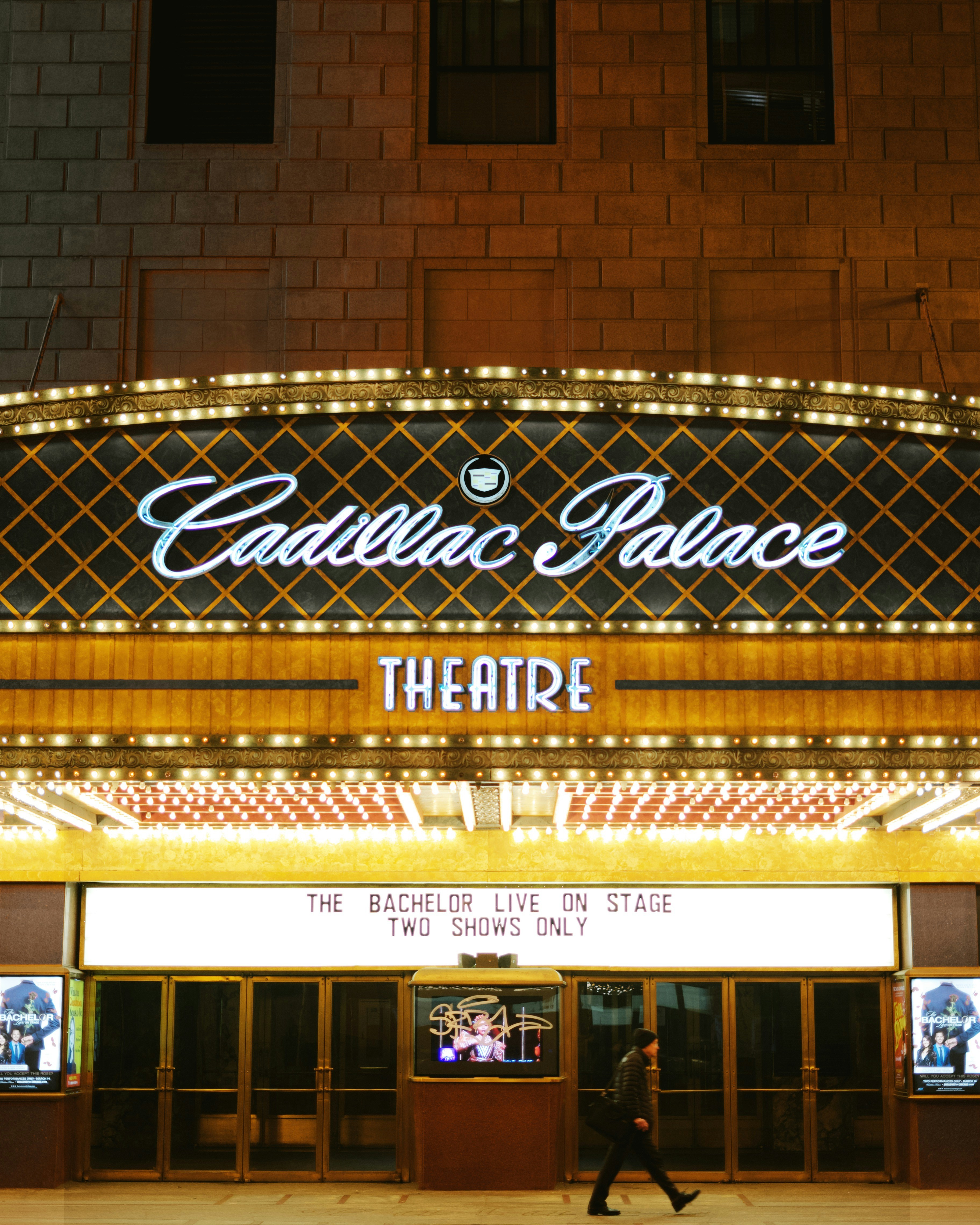 Cadillac Palace Marquee: Neon Script Under a Bulb-Lined Night