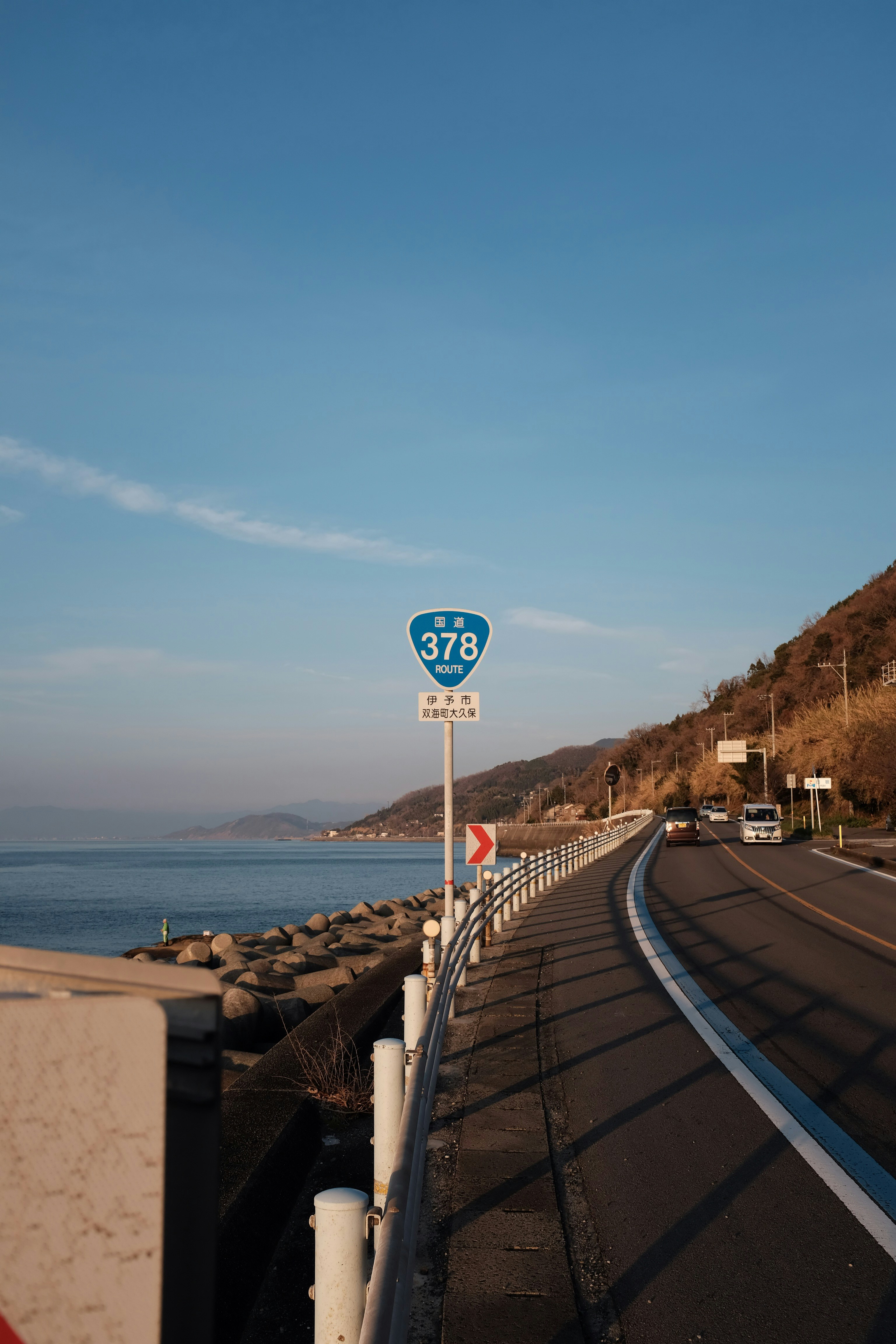 Coastal Highway Calms the Sea as Twilight Clouds Drift
