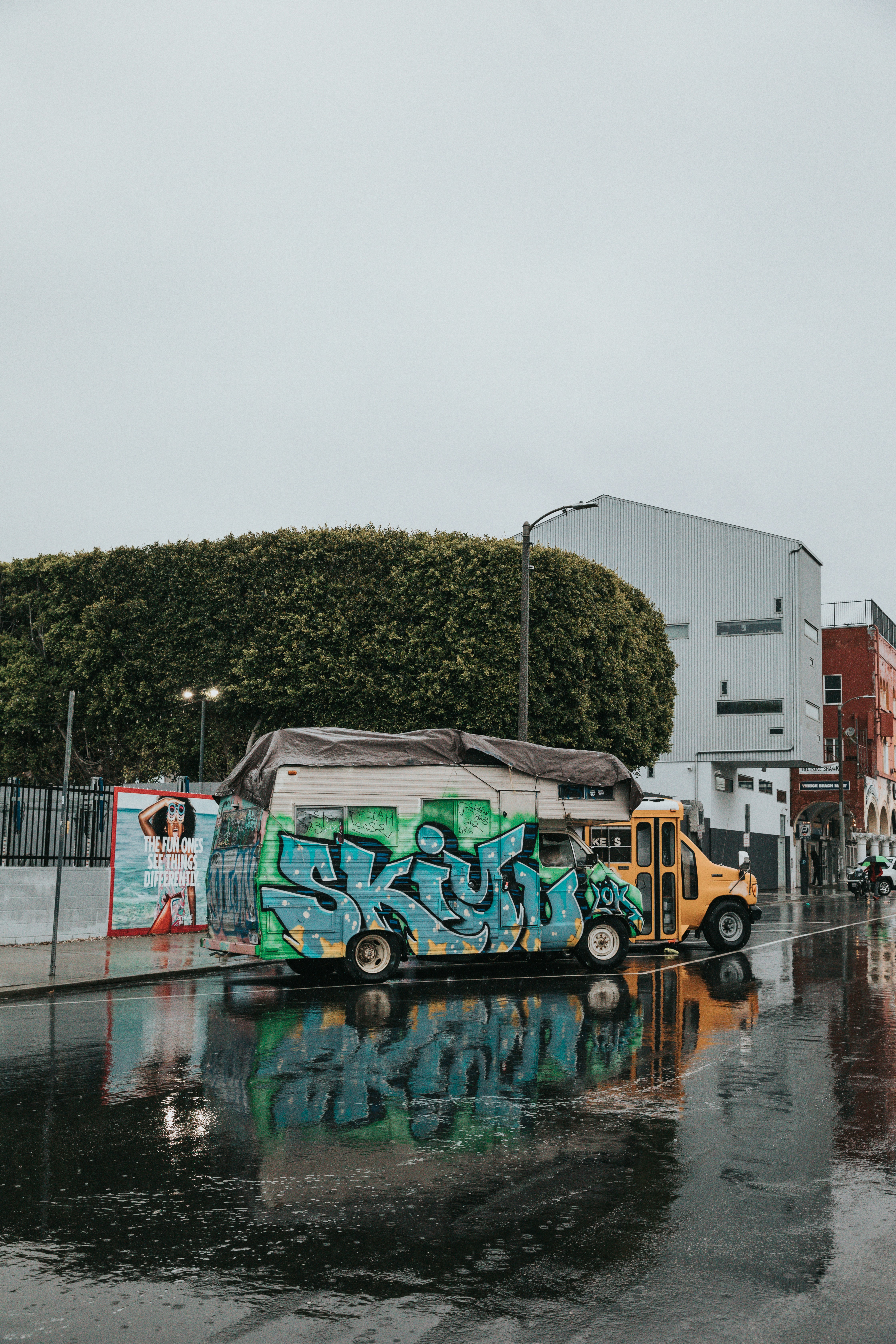 Green and yellow van on river during daytime photo – Free Art Image on ...