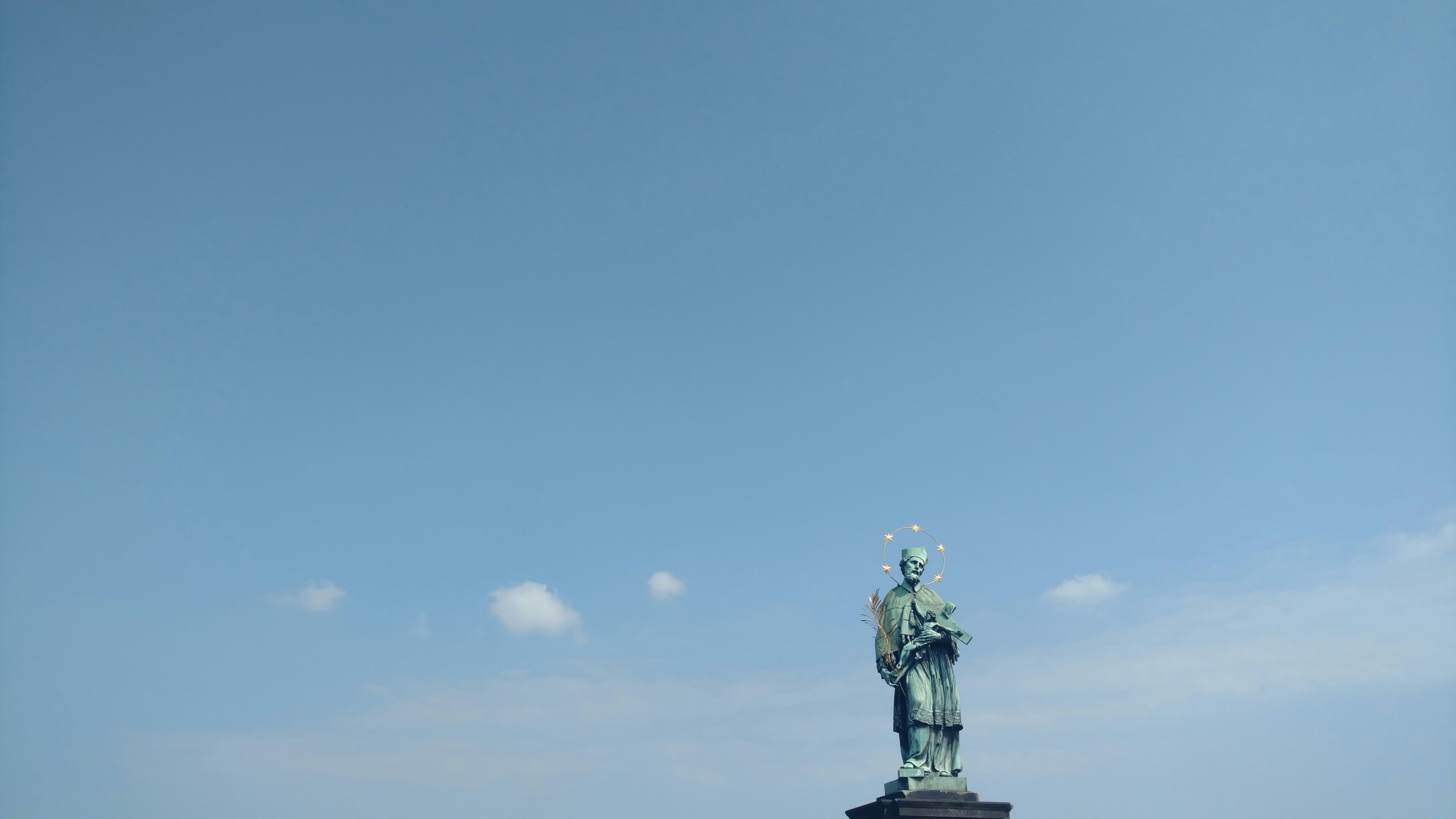 a statue on Charles Bridge in Prague