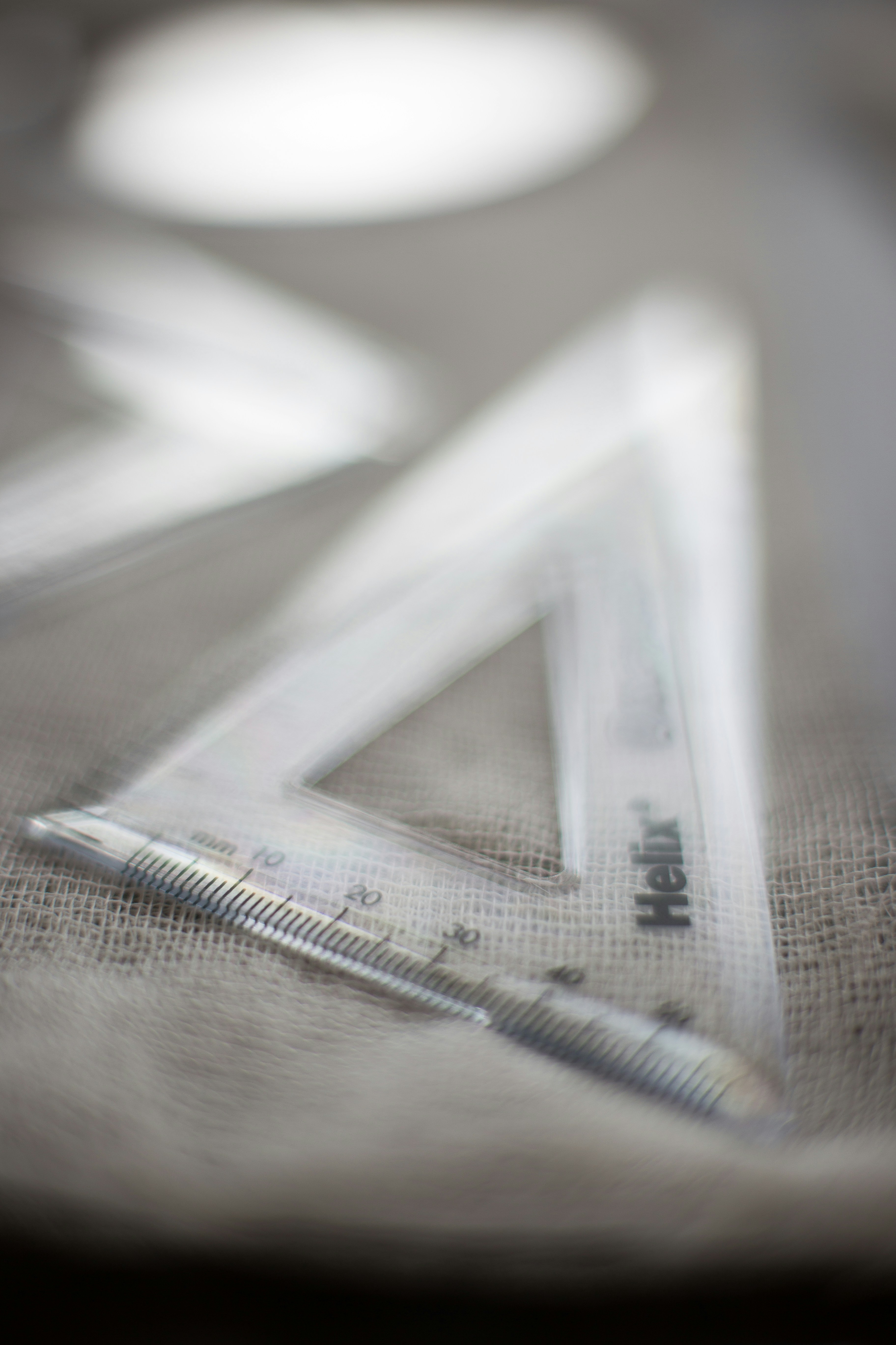 Geometric Precision: Helix and Triangle on Linen