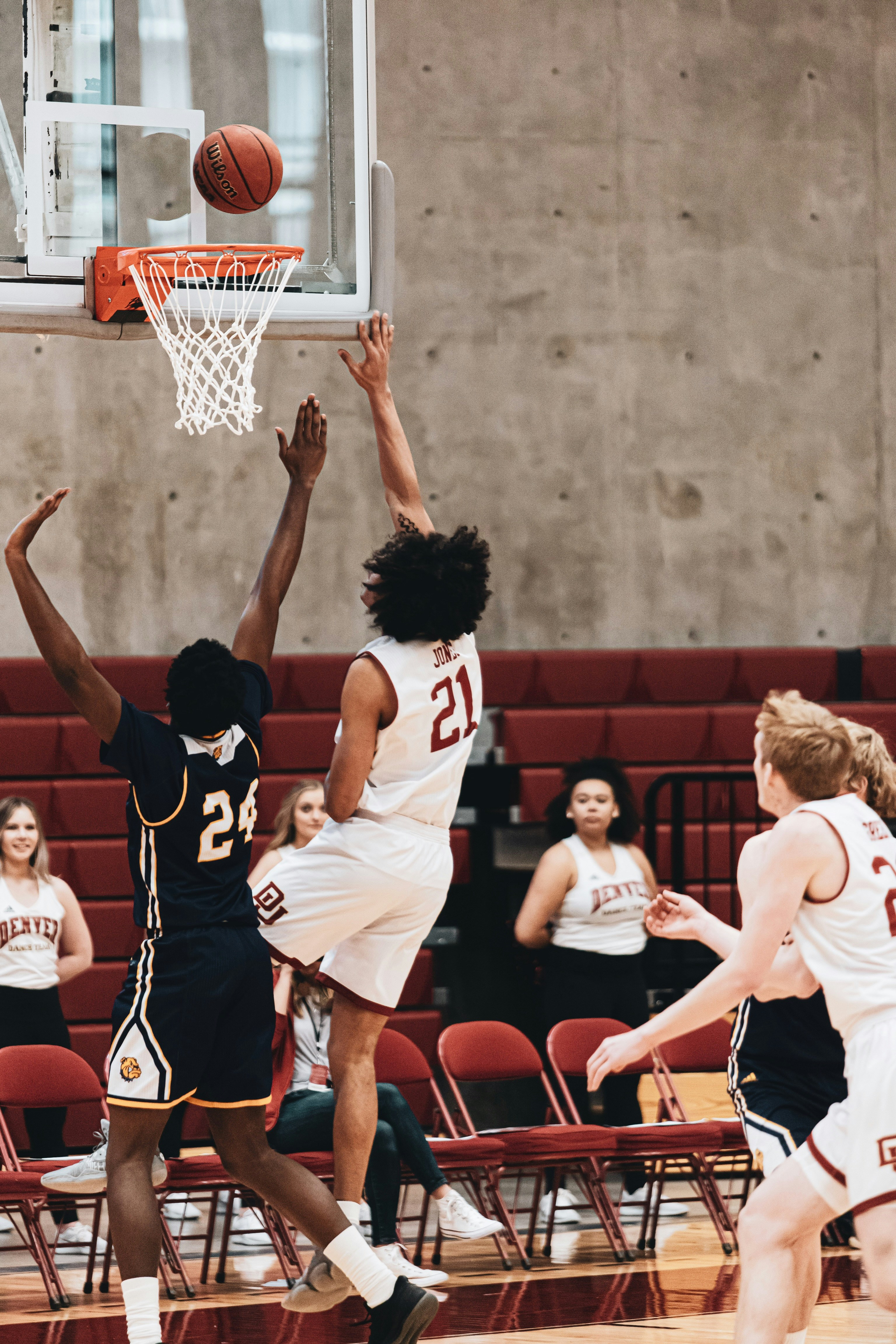 Man in white and red basketball jersey shirt playing basketball photo ...