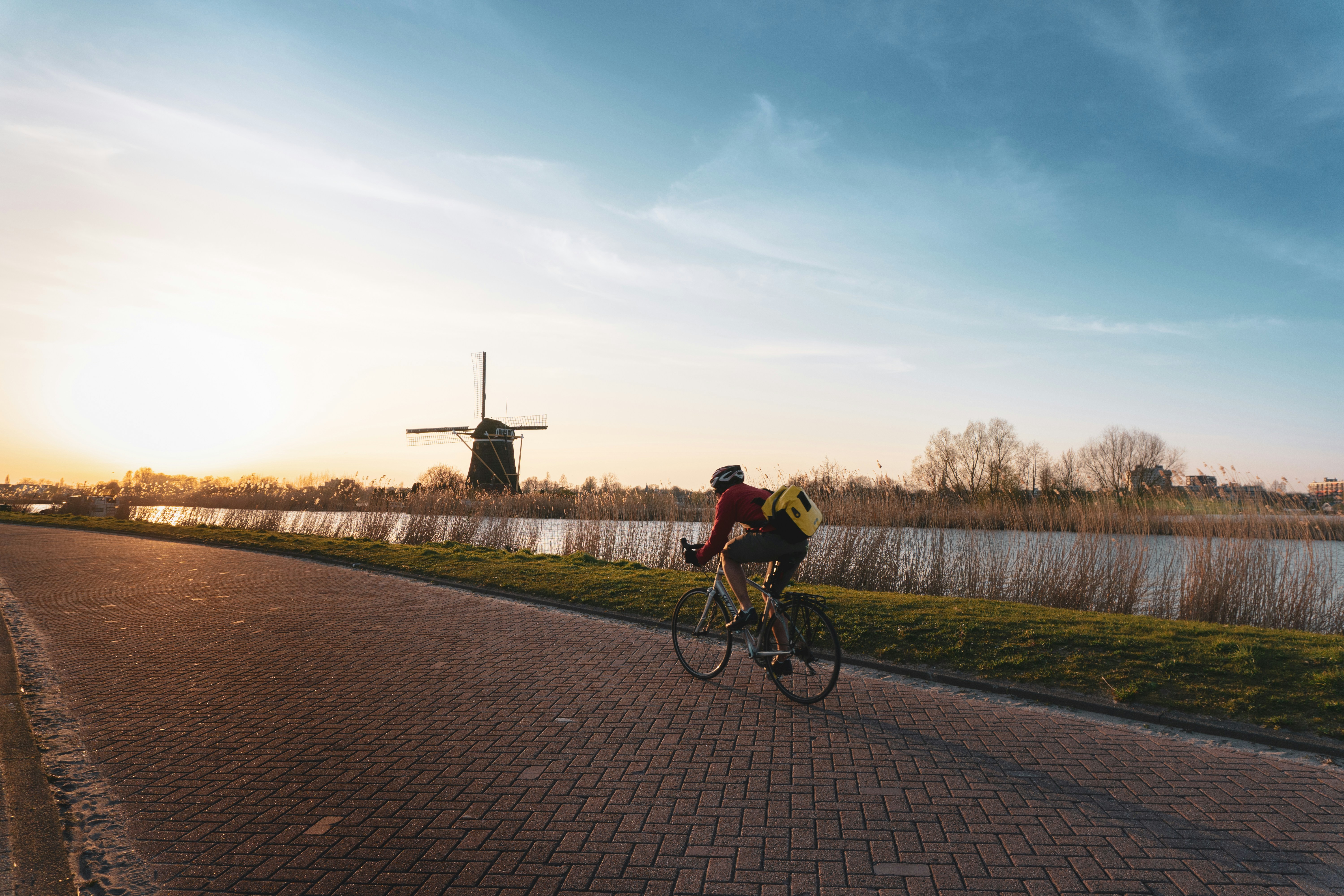 Sunset Sprint by a Dutch Windmill