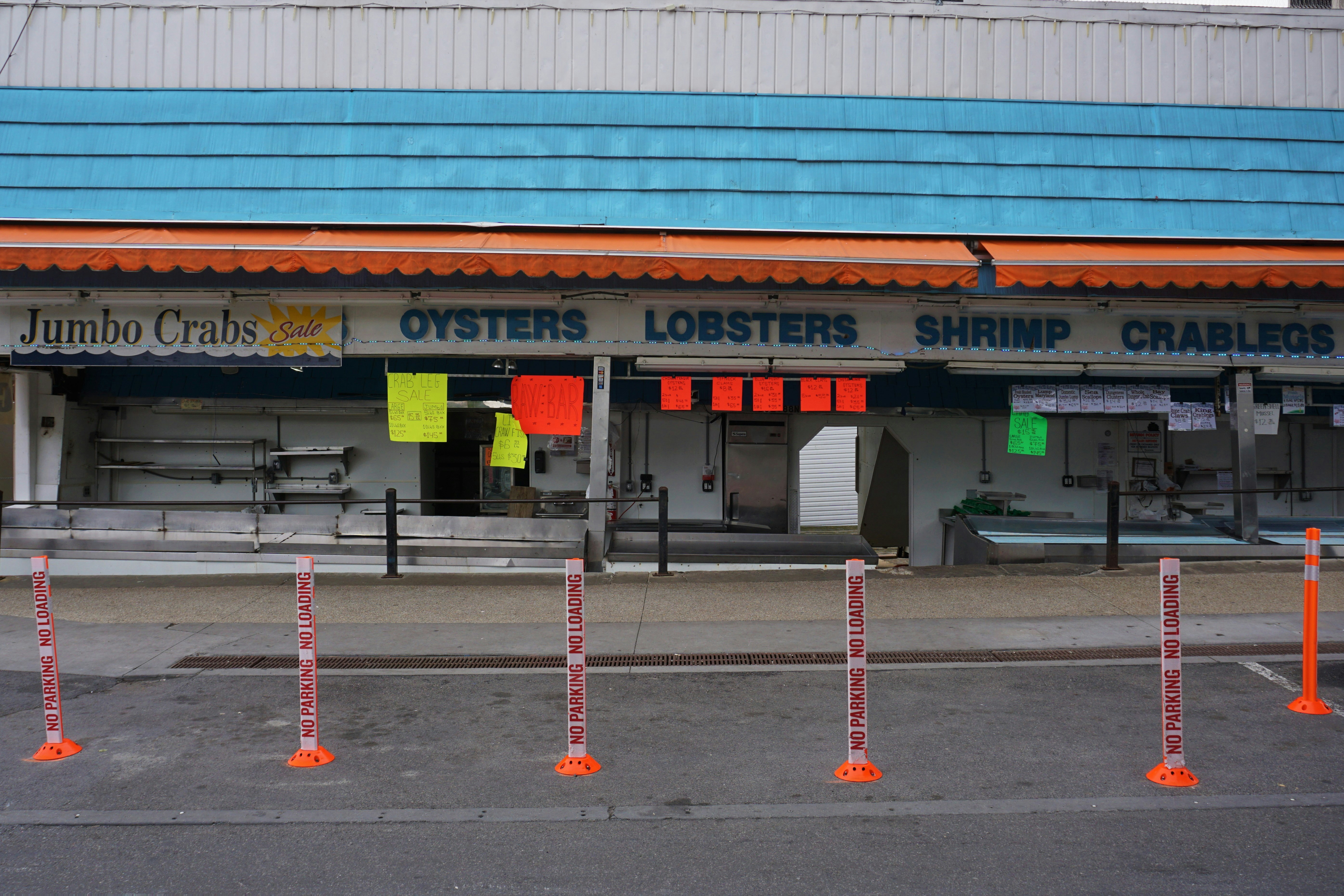 Colorful Frontage of a Seaside Seafood Stand
