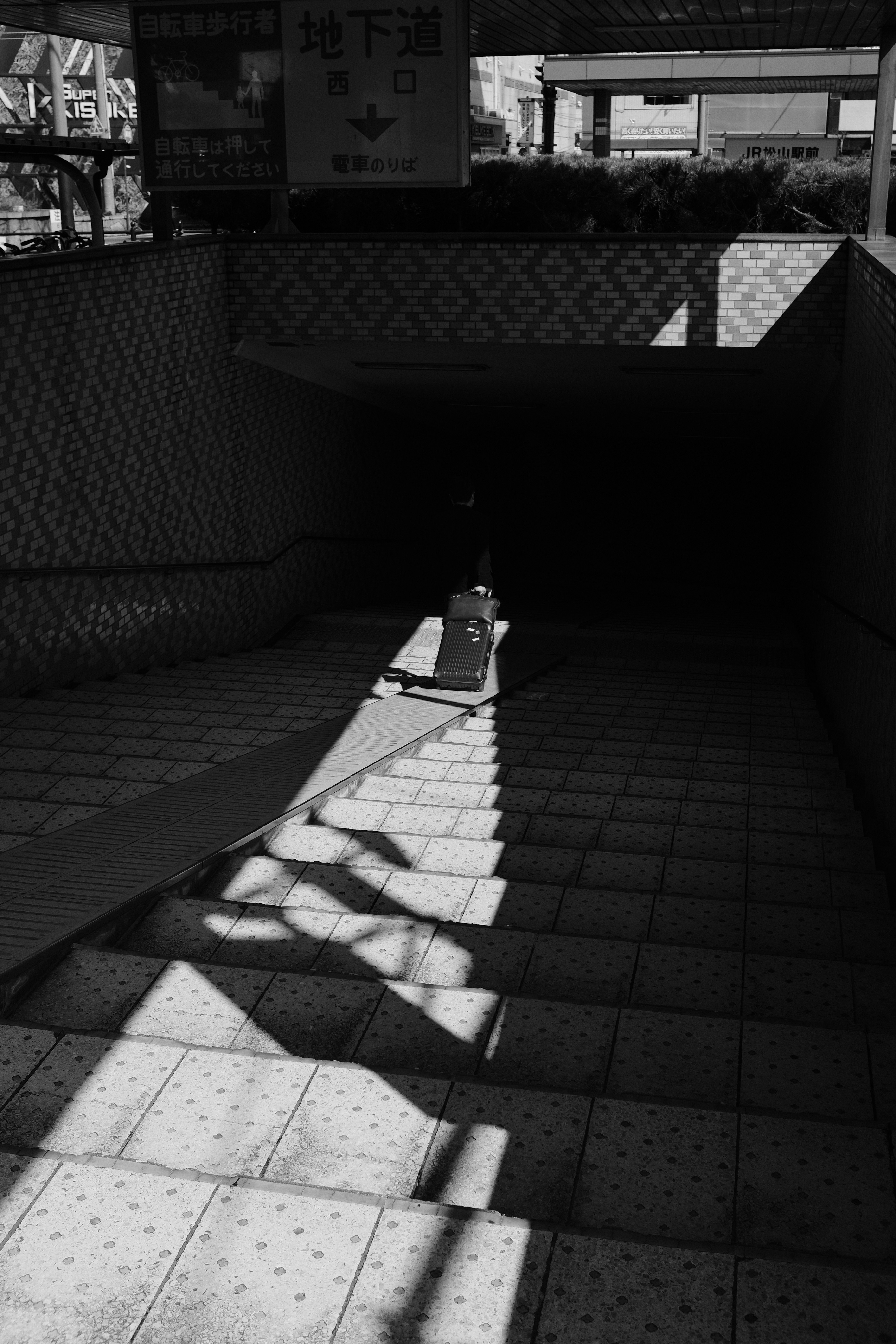 Grayscale photo of person walking on sidewalk photo – Free Corridor ...