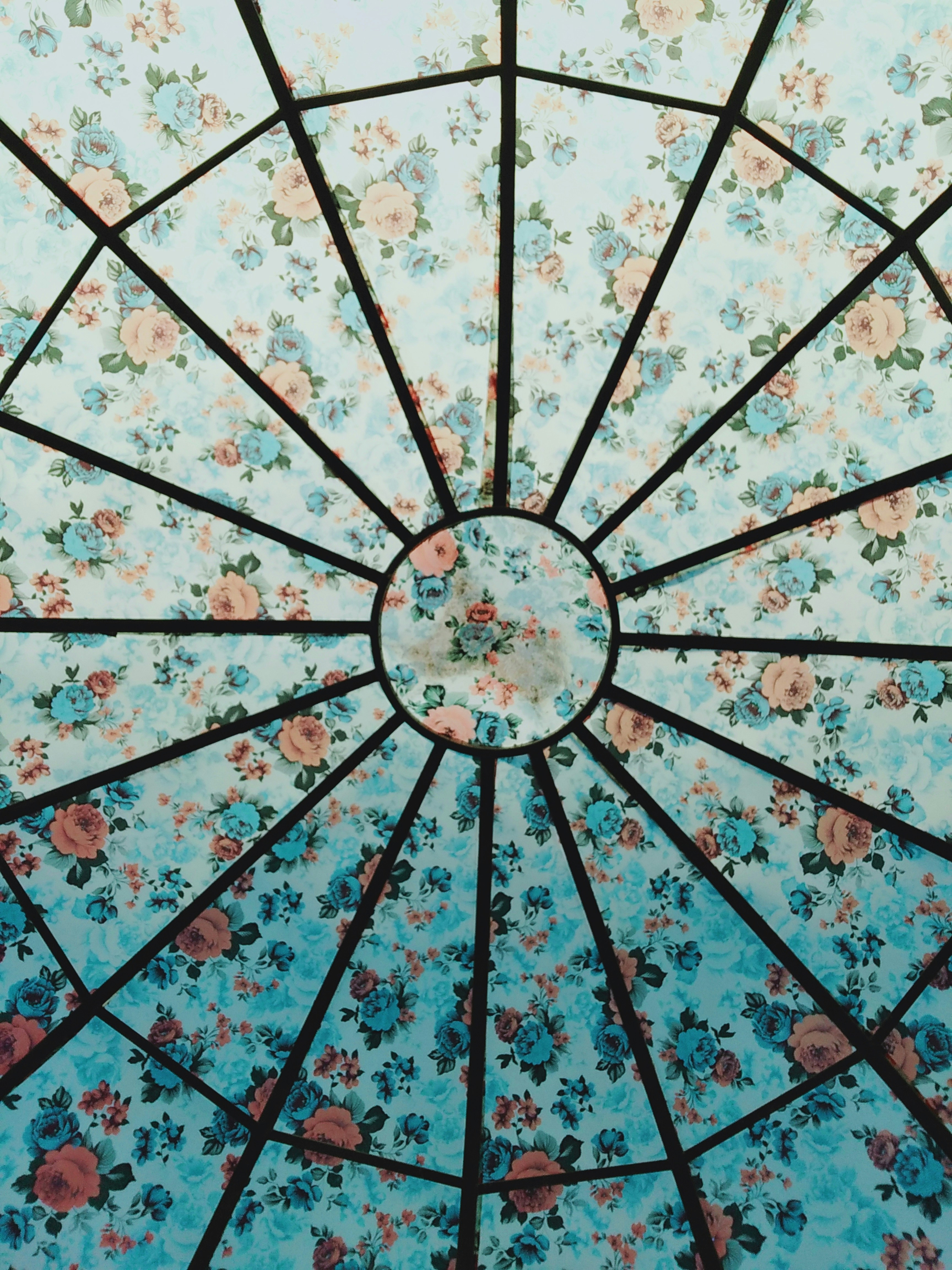white and brown floral ceiling