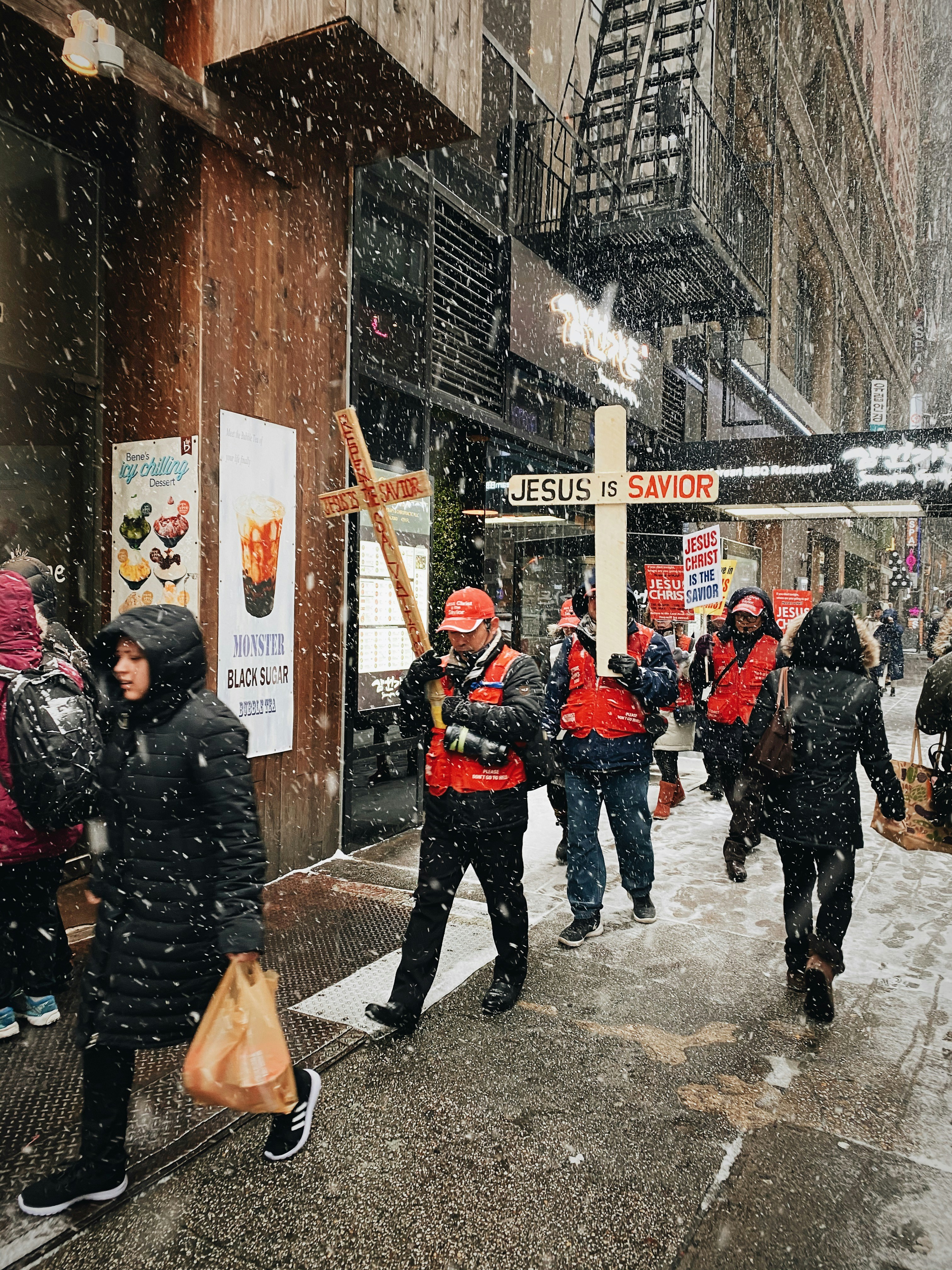 Faith in the Snow: Procession Through a City Sidewalk