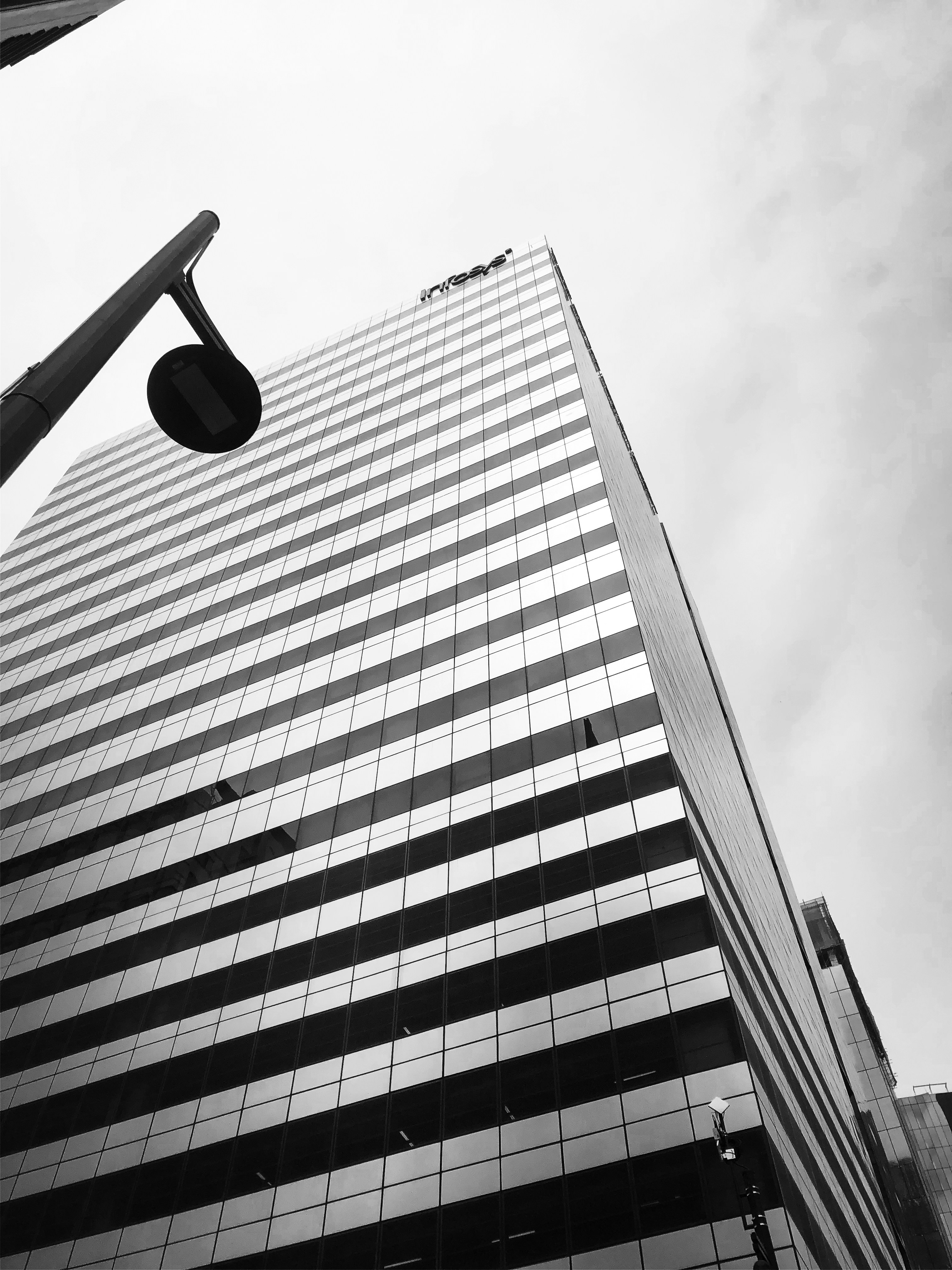 Grayscale photo of street light near building photo – Free Bgc Image on ...