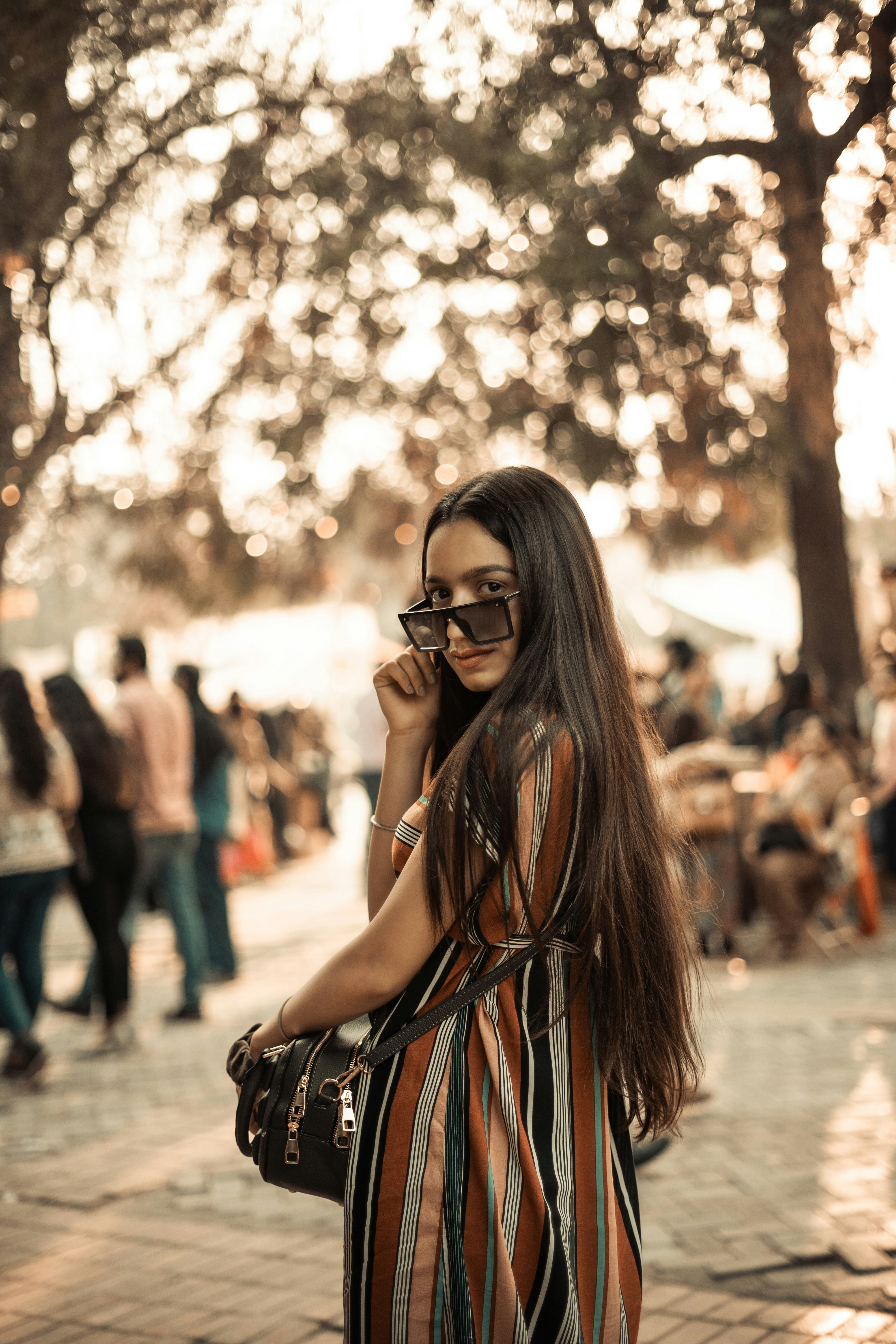 Stripe-Clad in Sunlit Silence: A Market Portrait