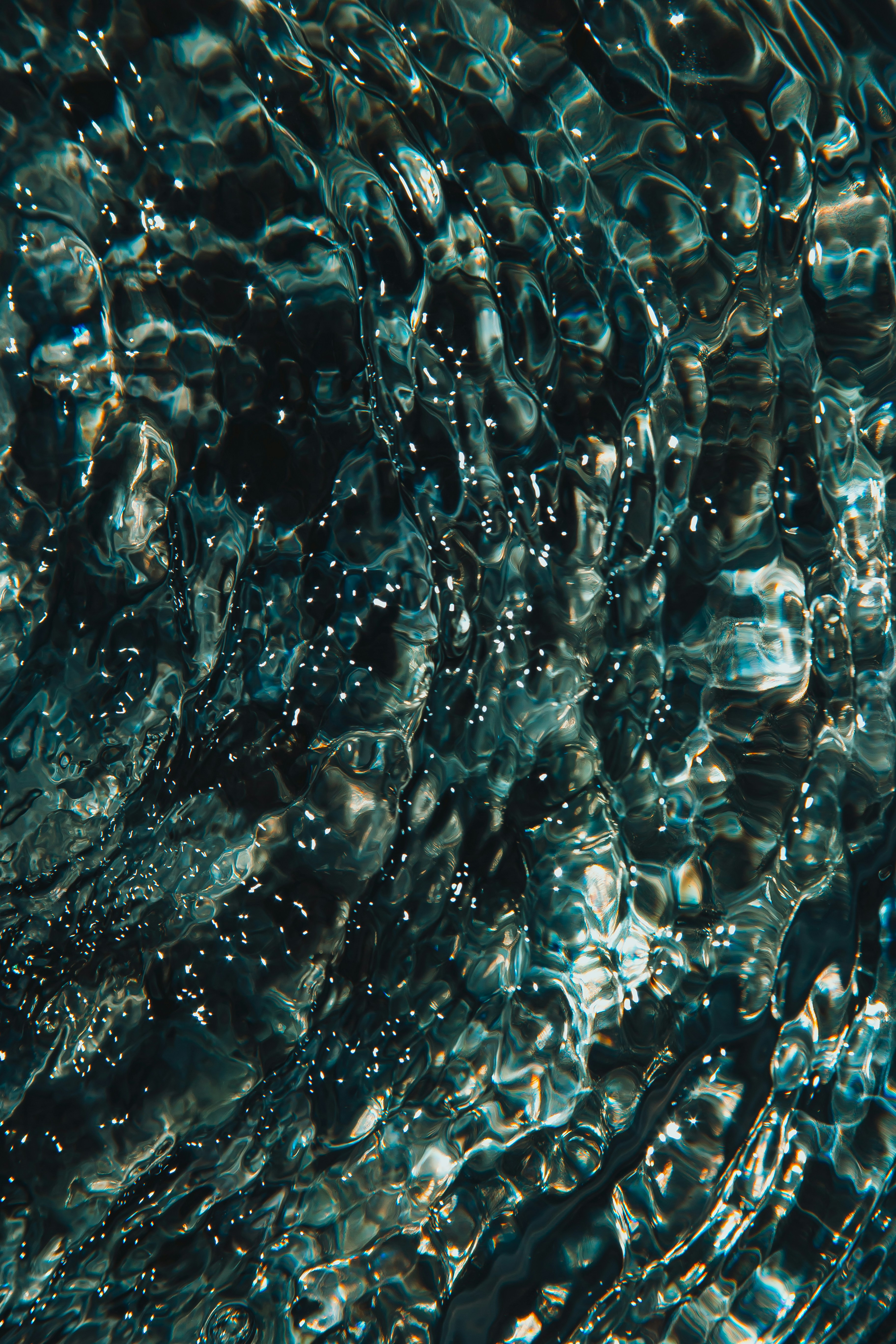 Water drops on body of water photo – Free Grey Image on Unsplash