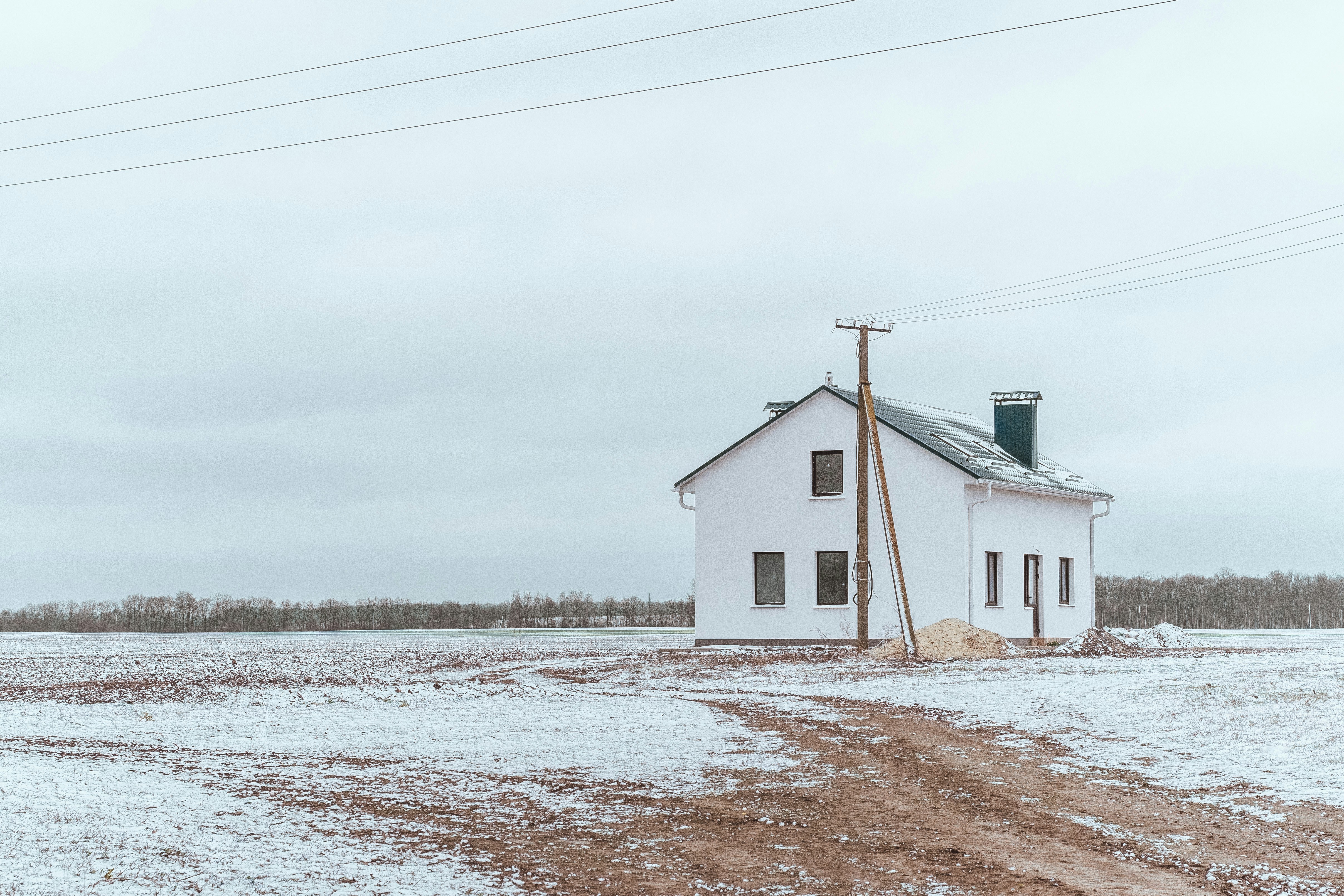 White wooden house near body of water during daytime photo – Free Grey ...