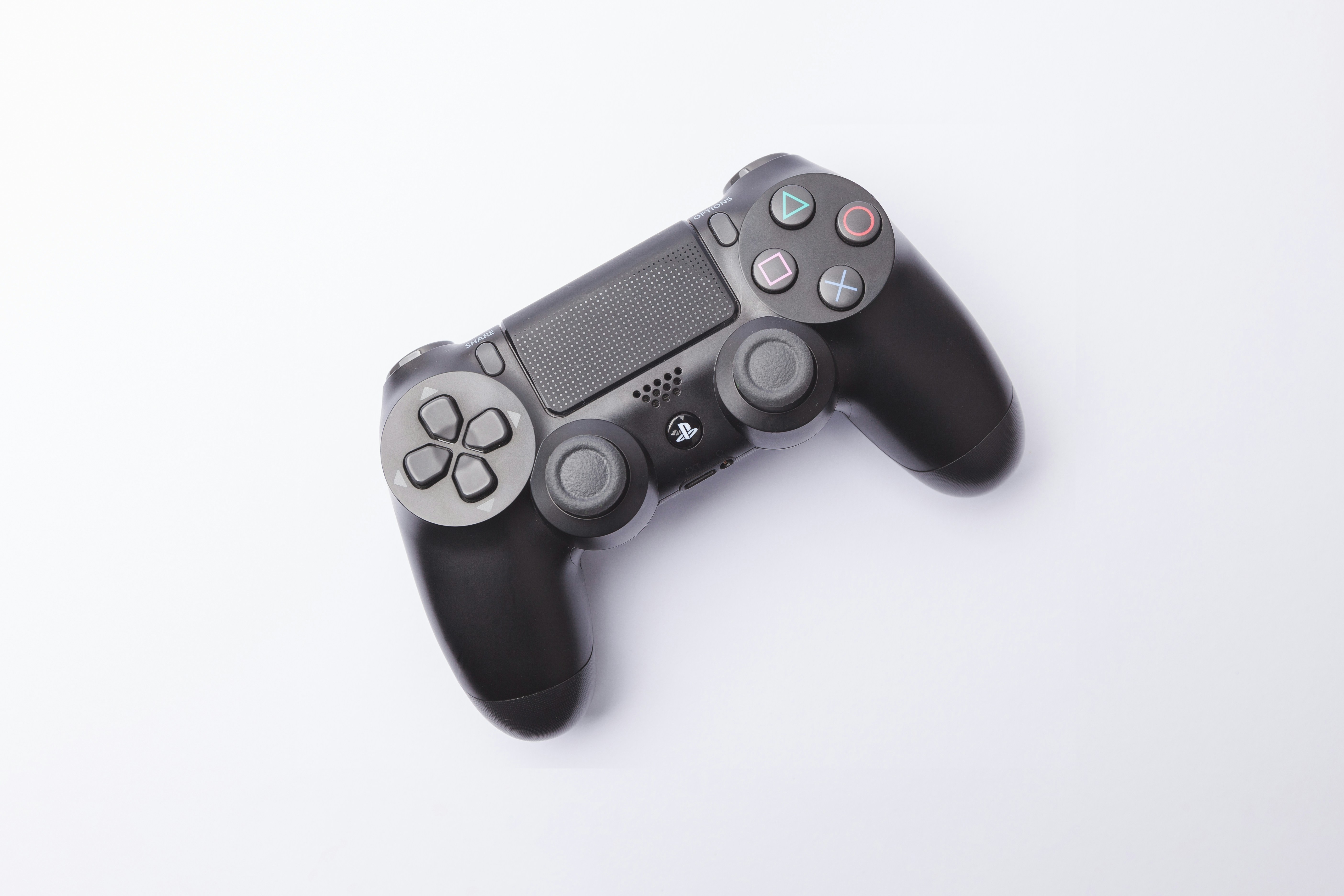 Black sony ps 4 game controller photo – Free Grey Image on Unsplash