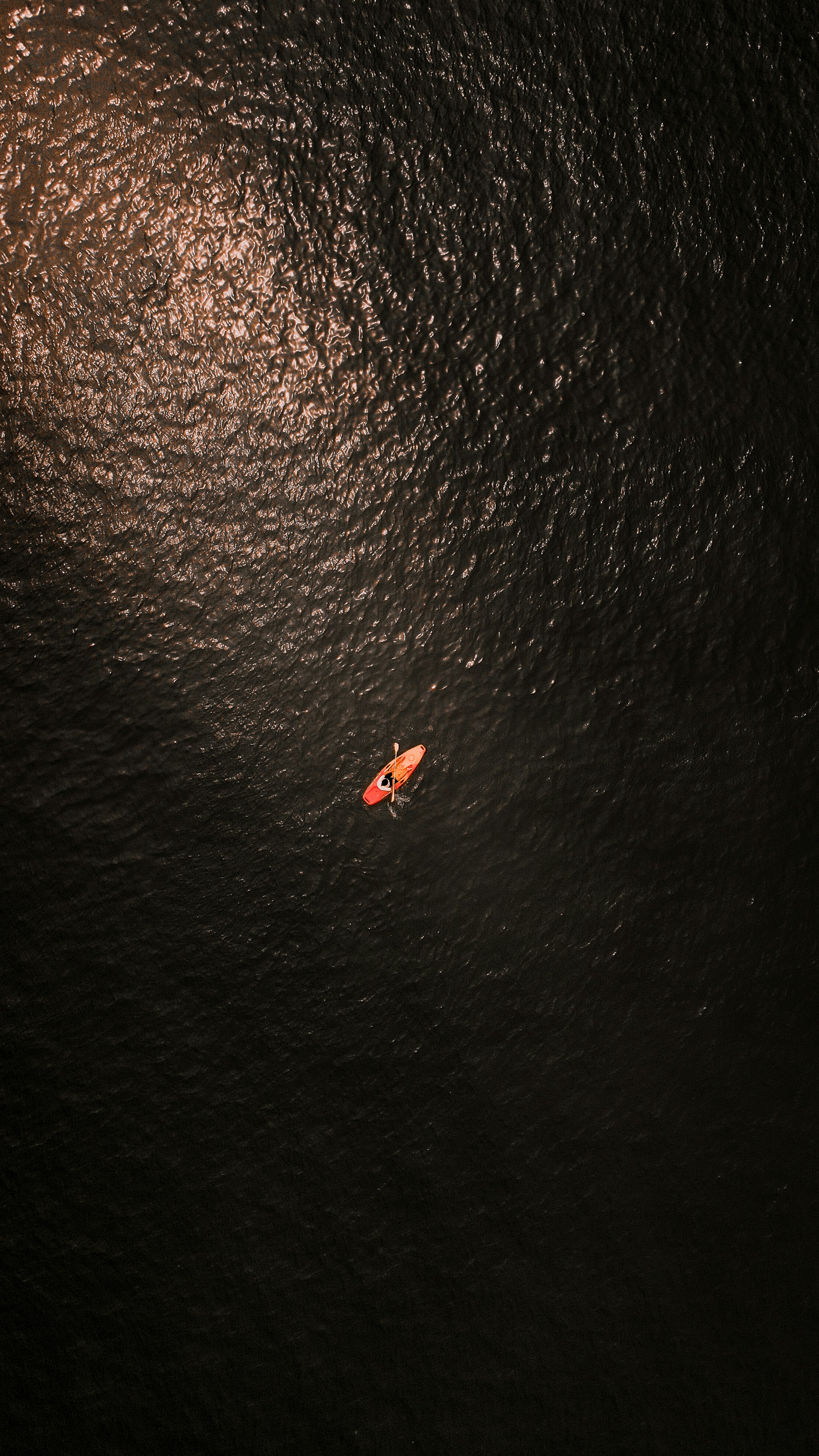 Solitary Paddle on Midnight Waters