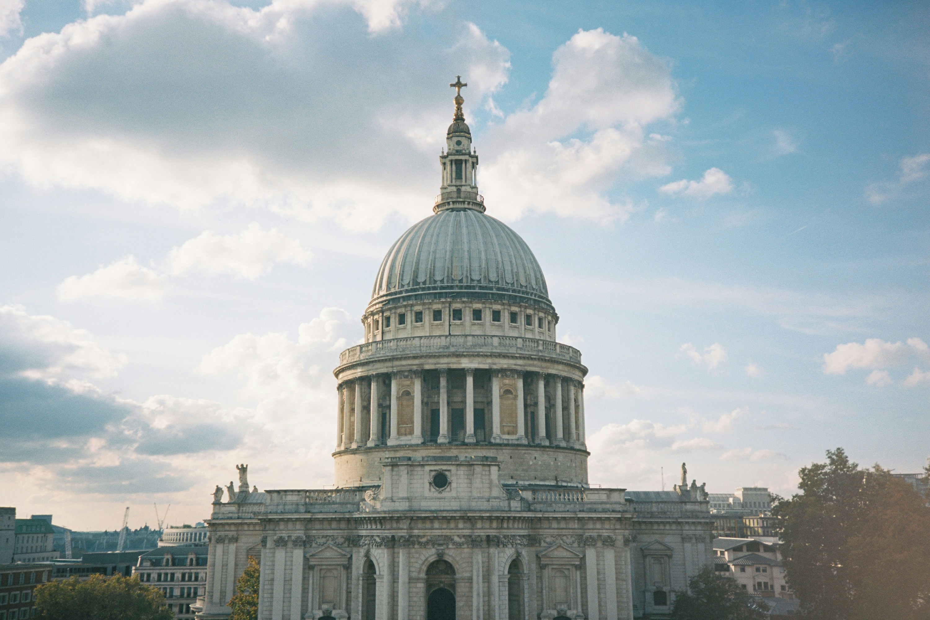 White concrete dome building under white clouds during daytime photo ...