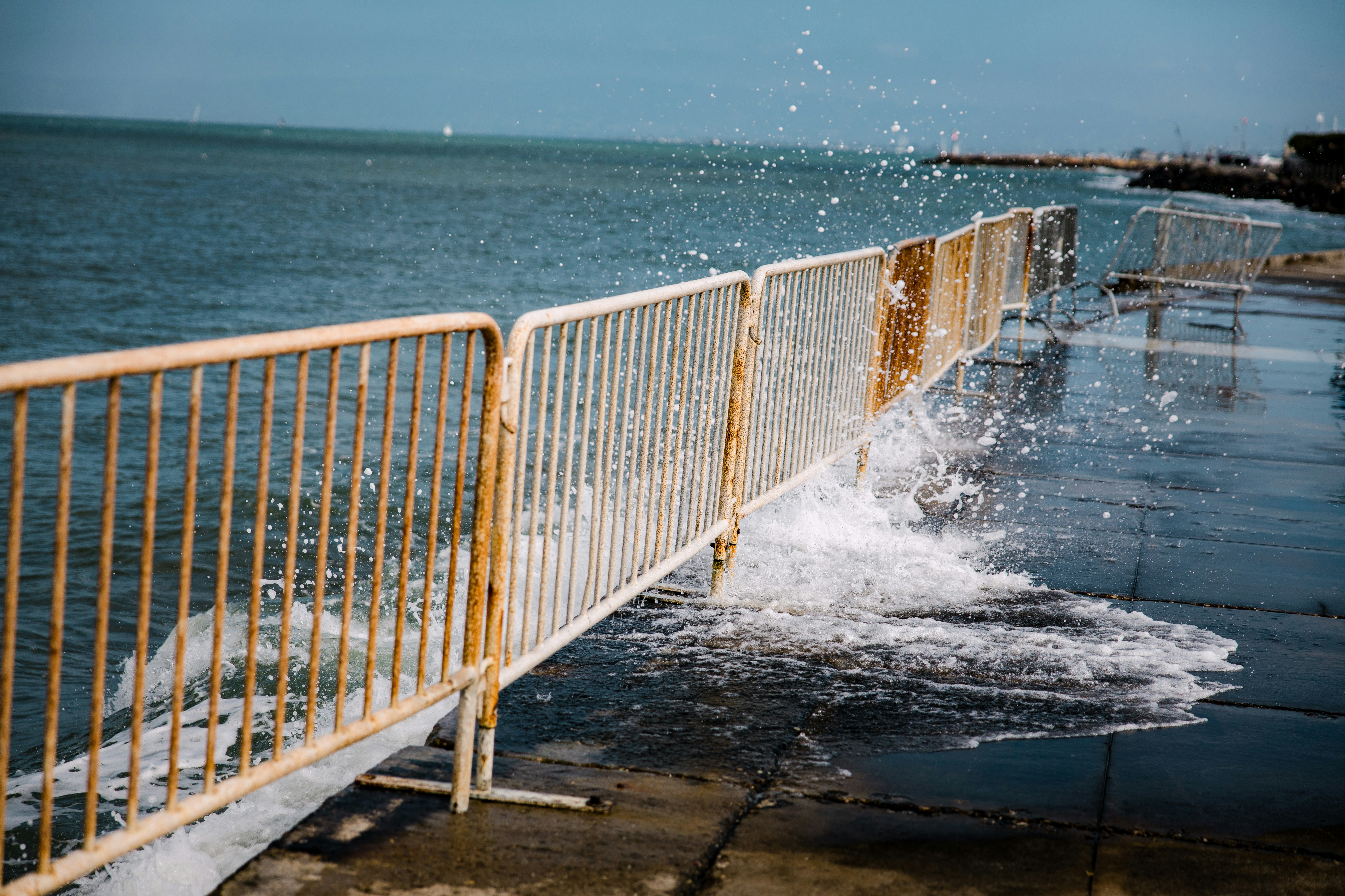 Stormy Sea Barrier: splashes and rails along a tidal edge