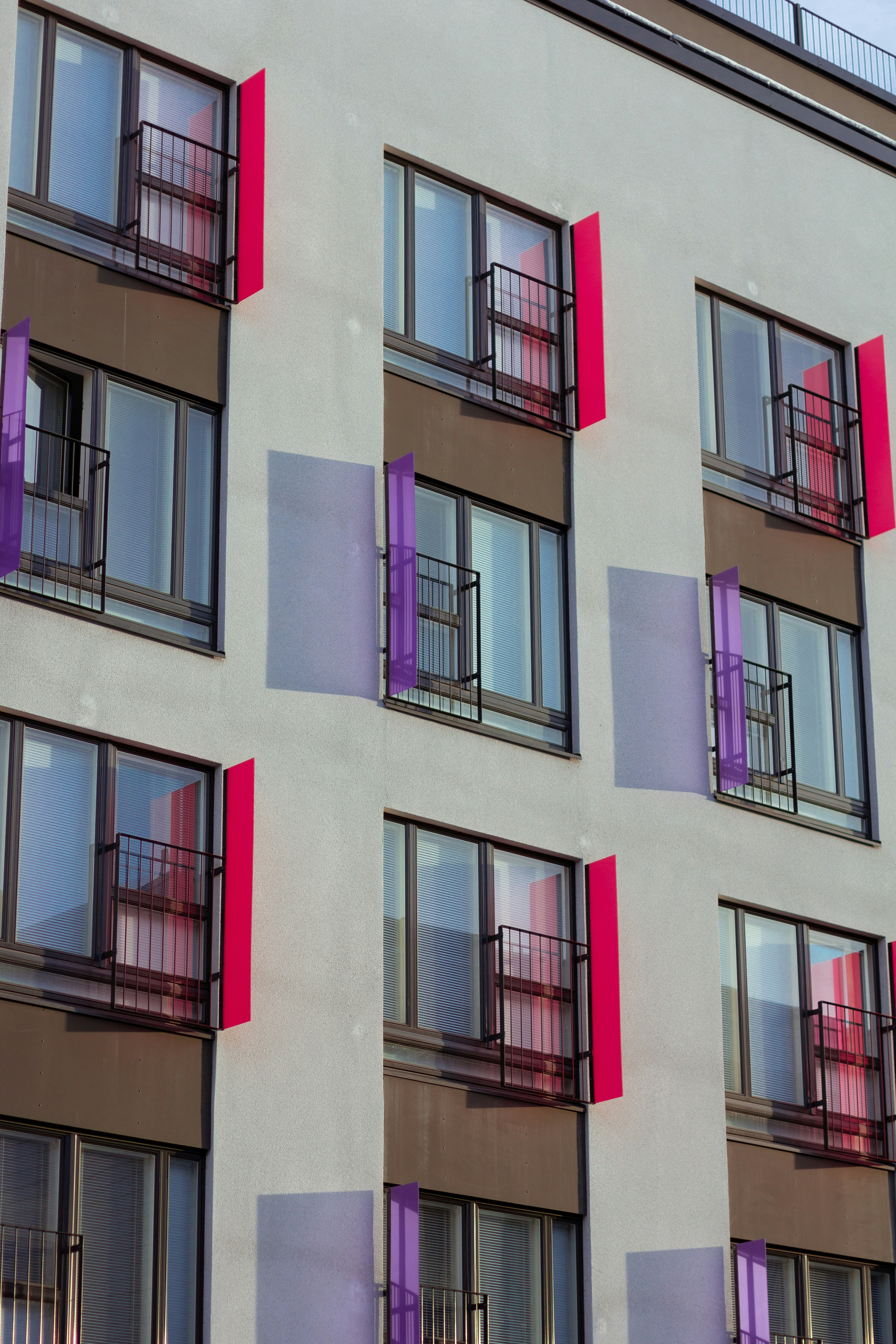 Colorful windows on a residential building 