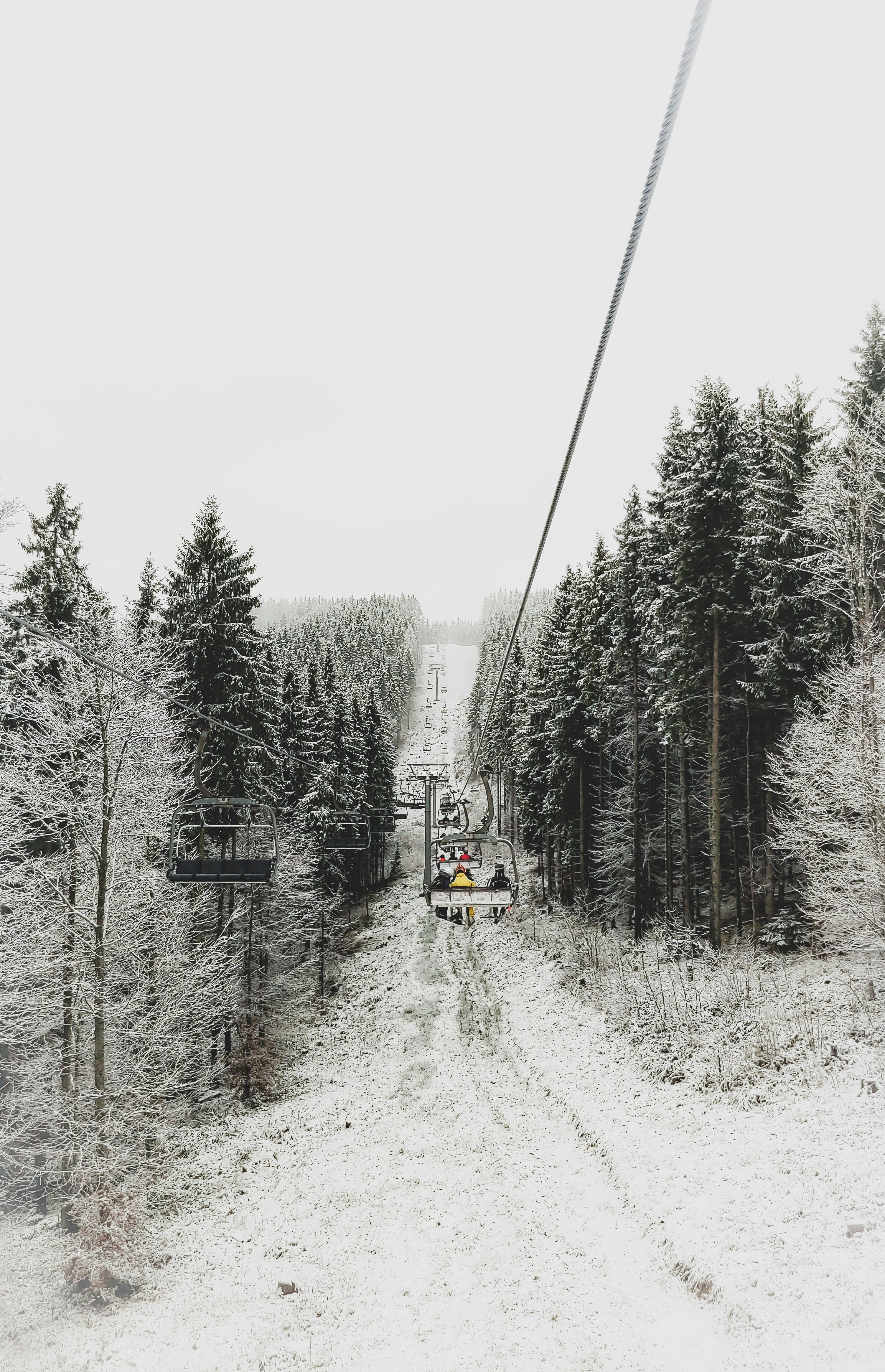 Red and white cable car on snow covered ground photo – Free Grey Image ...
