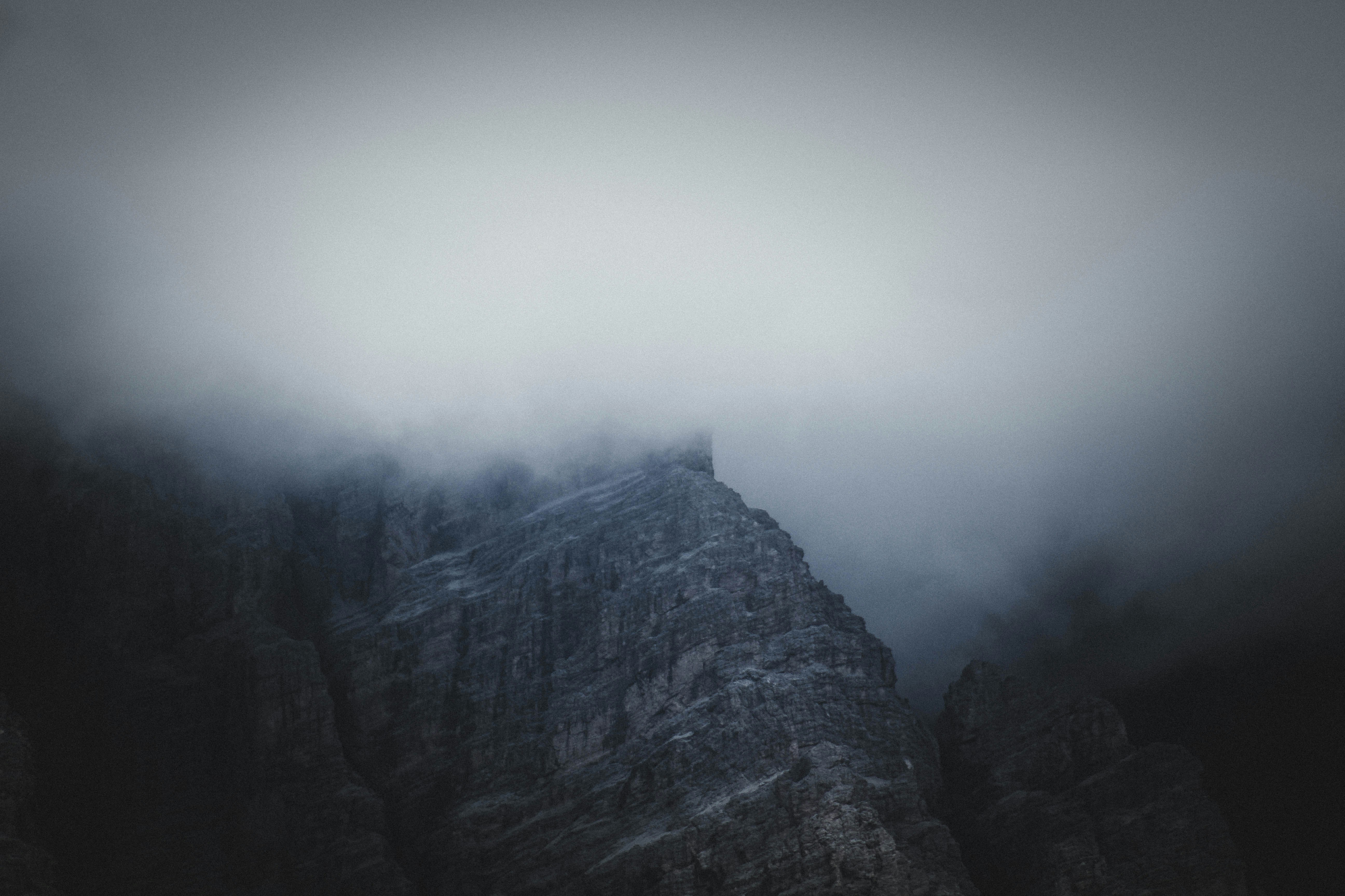 Gray rocky mountain under white sky during daytime photo – Free Grey ...