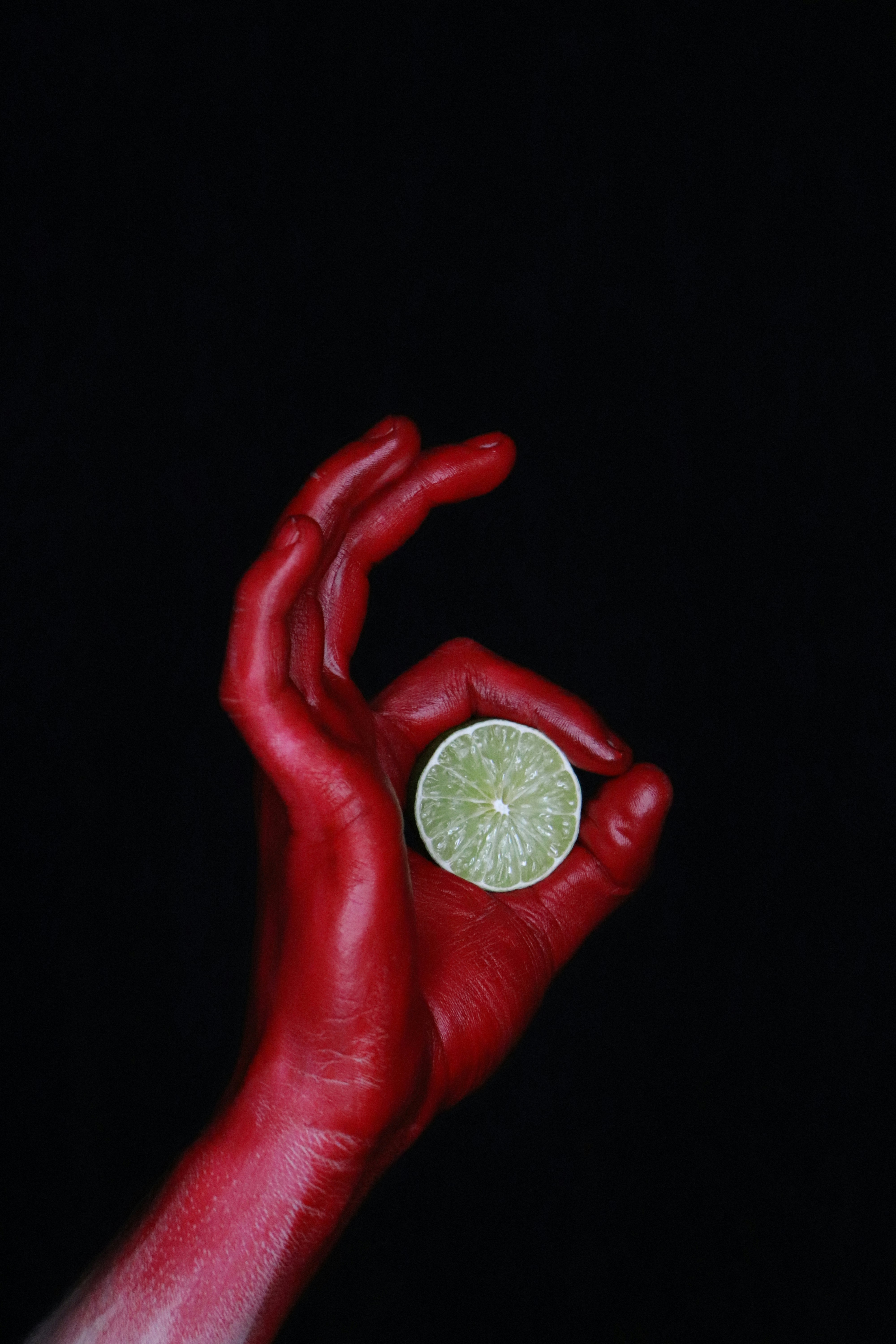 red hand and lime