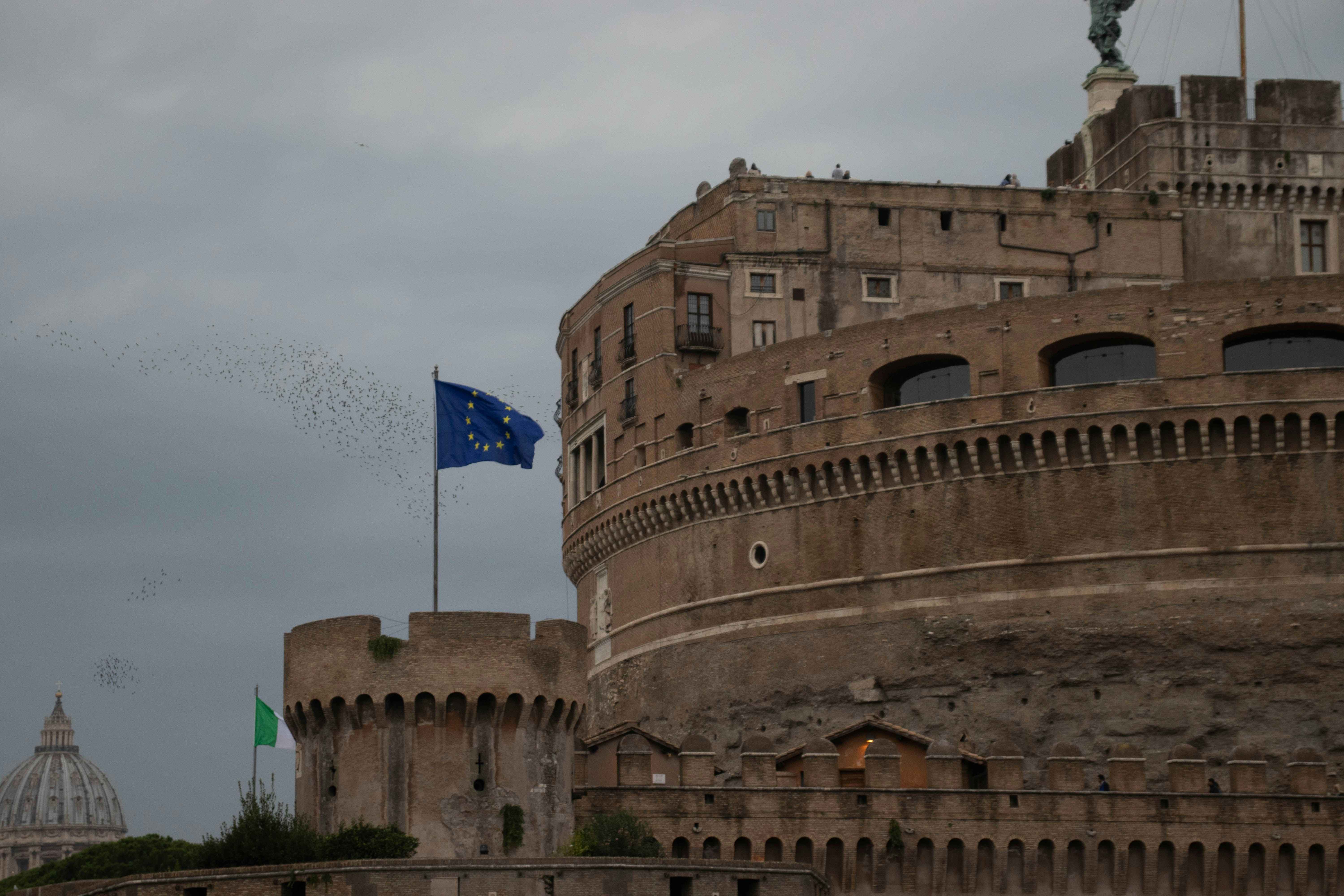 Castel Sant’Angelo Under Gray Skies: EU Flag Above the Roman Fortress