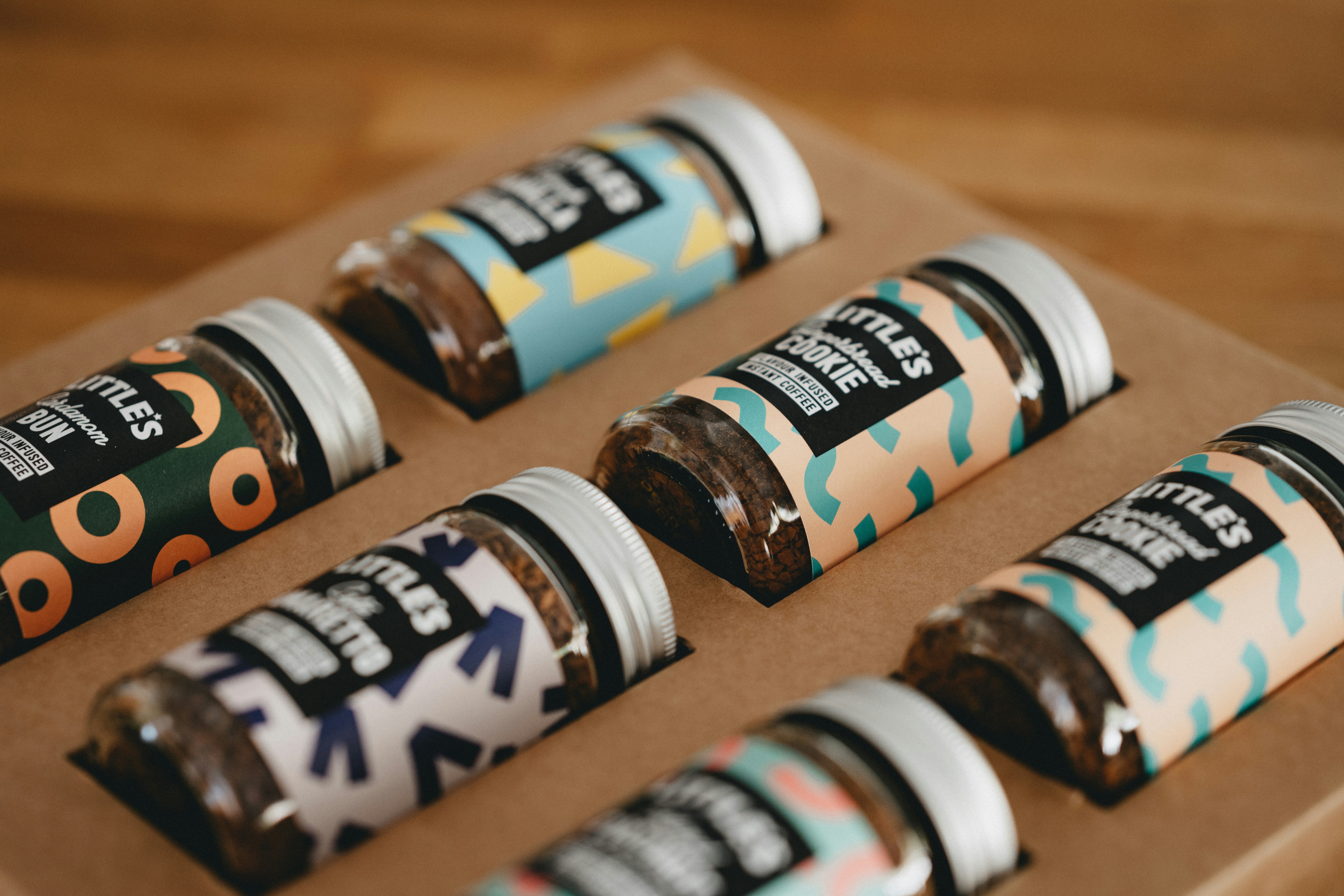 Three white and blue labeled bottles photo – Free Bottle Image on Unsplash