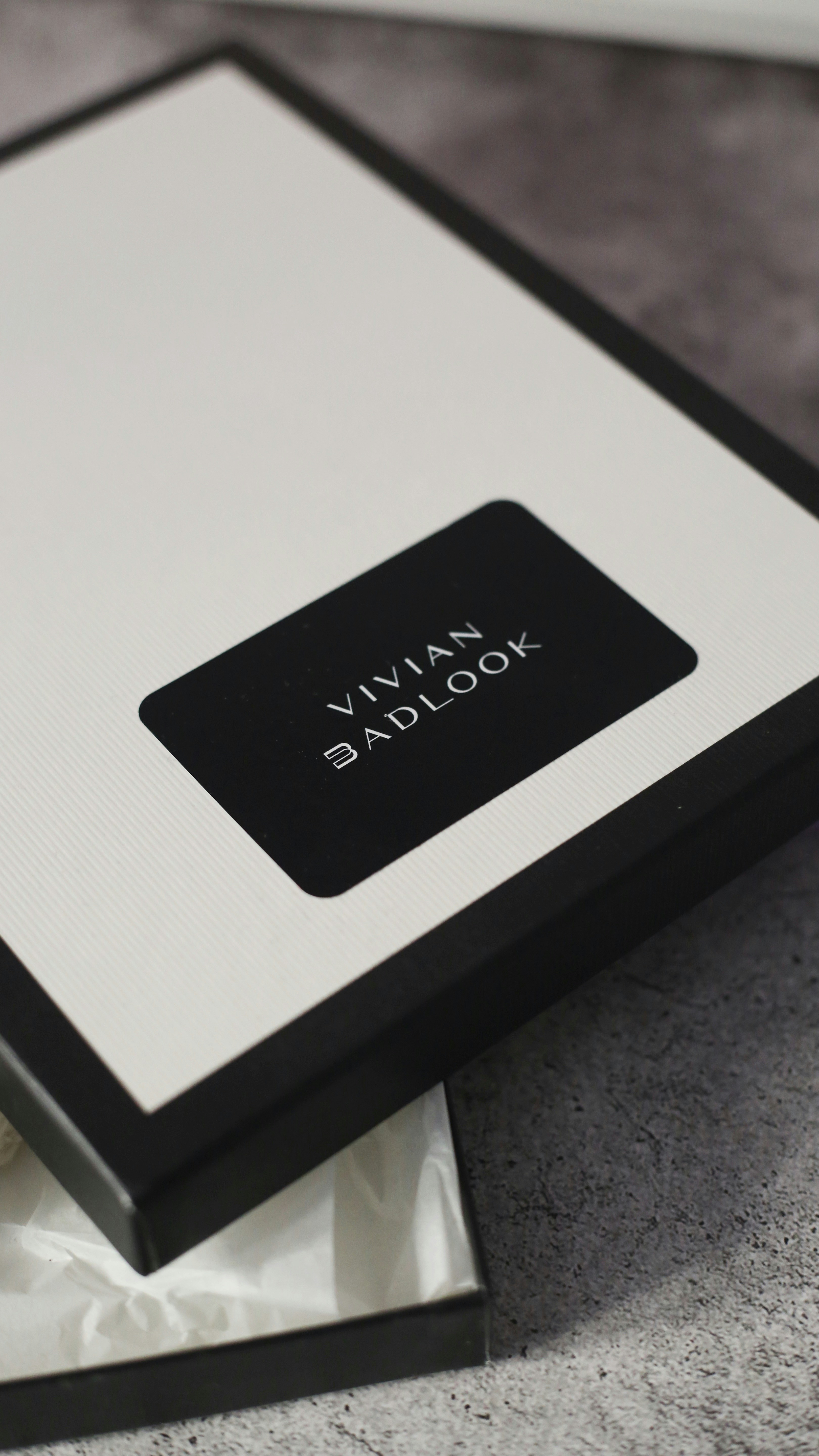 Edge of Quiet Packaging: The Vivian Adlook Box on a Matte Surface